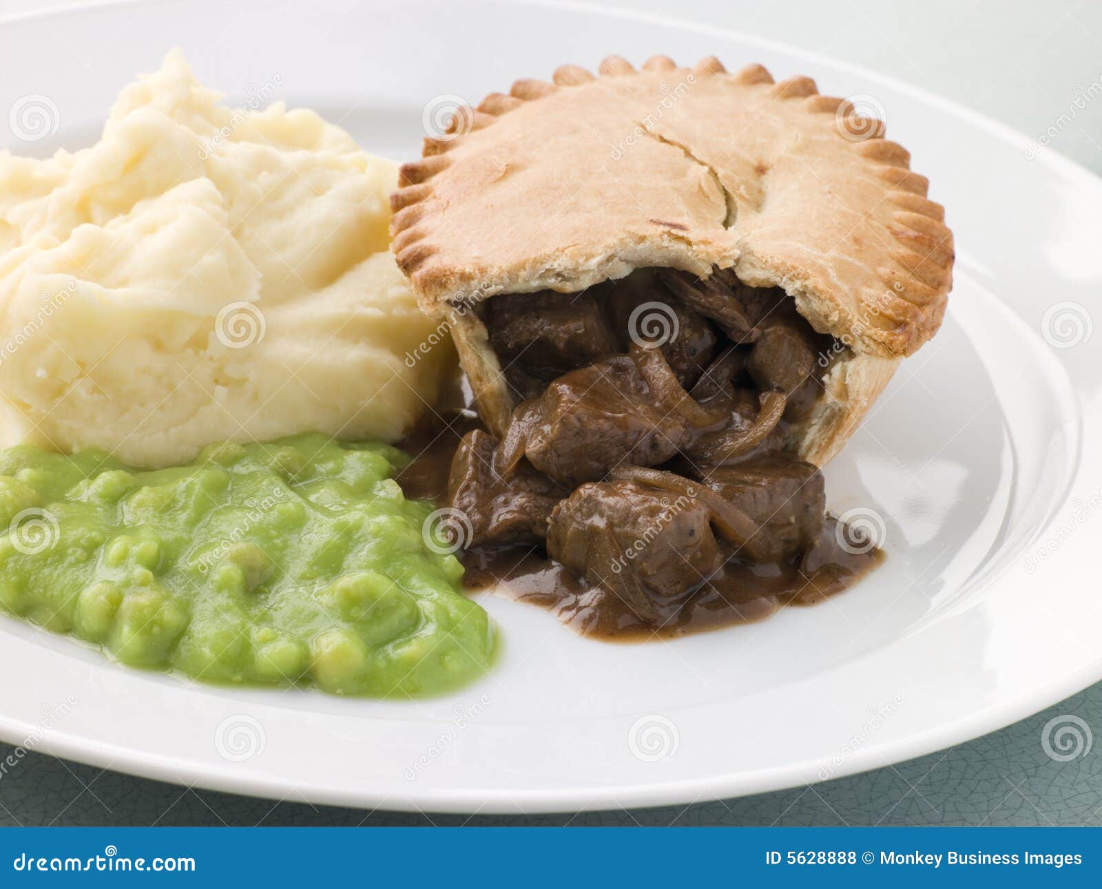 Steak Pie Mash and Mushy Peas Stock Photo - Image of puree, cockney ...