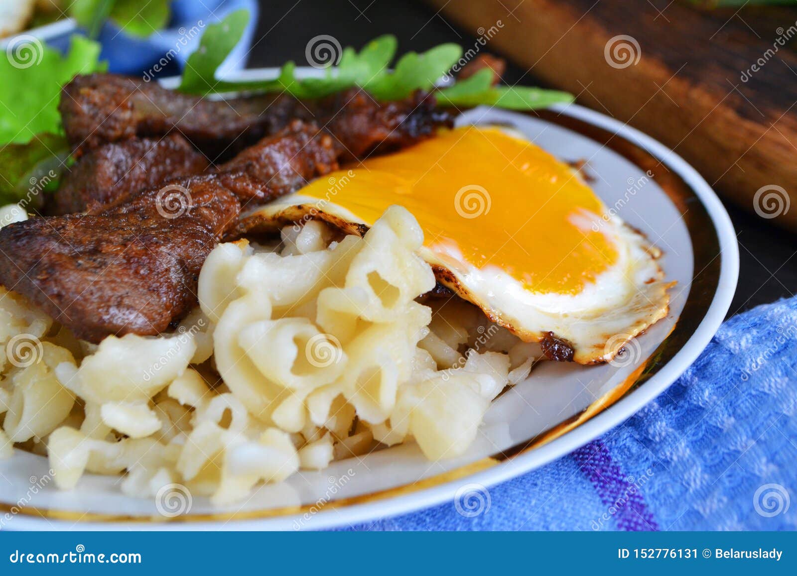 Steak of Wild Boar with Egg and Pasta. Home Russian Cuisine Stock Image ...