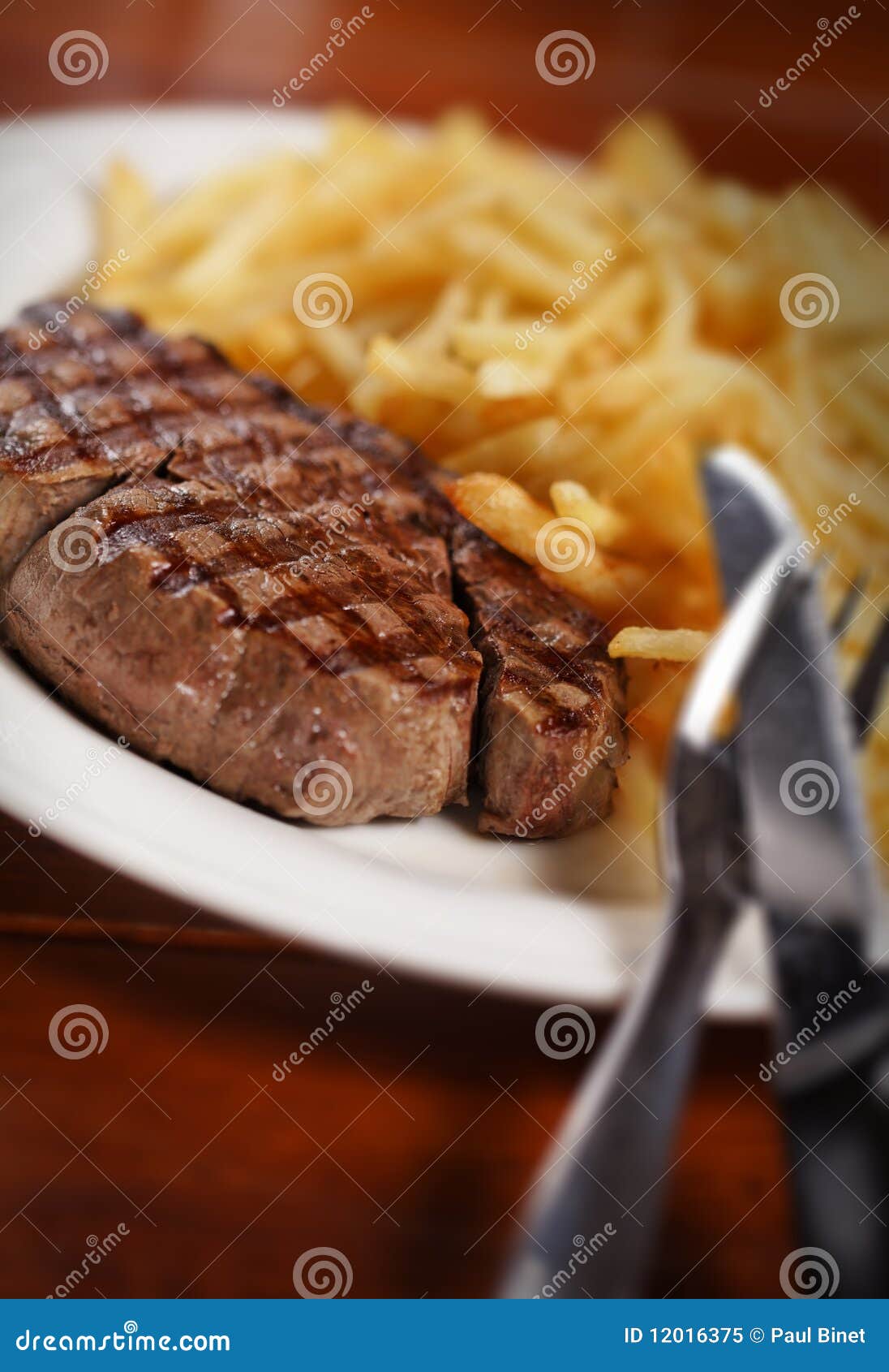 Steak on a wooden table stock image. Image of restaurant - 12016375