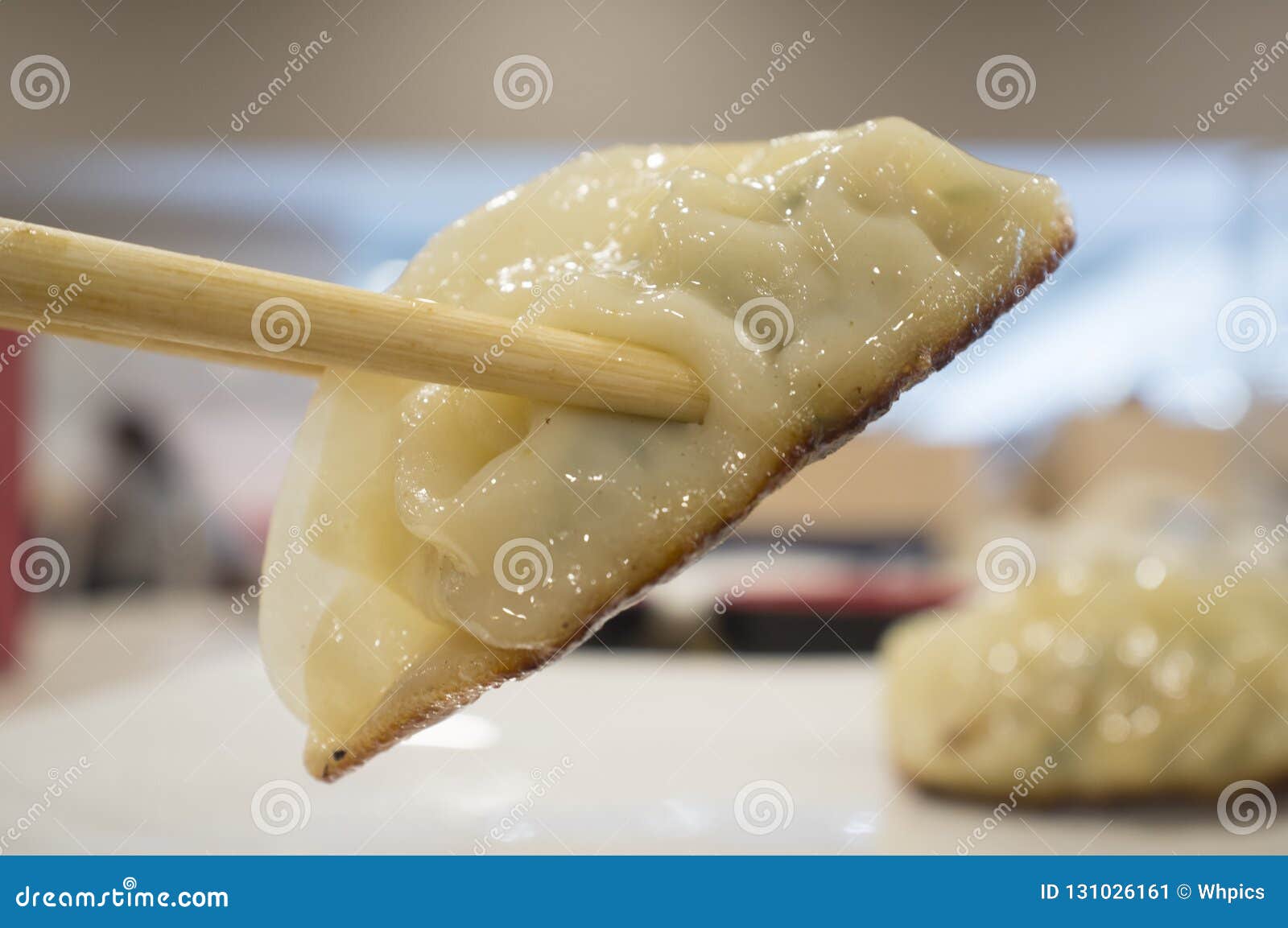 Steam Dumpling Gyoza between Chopsticks Stock Image - Image of chinese ...