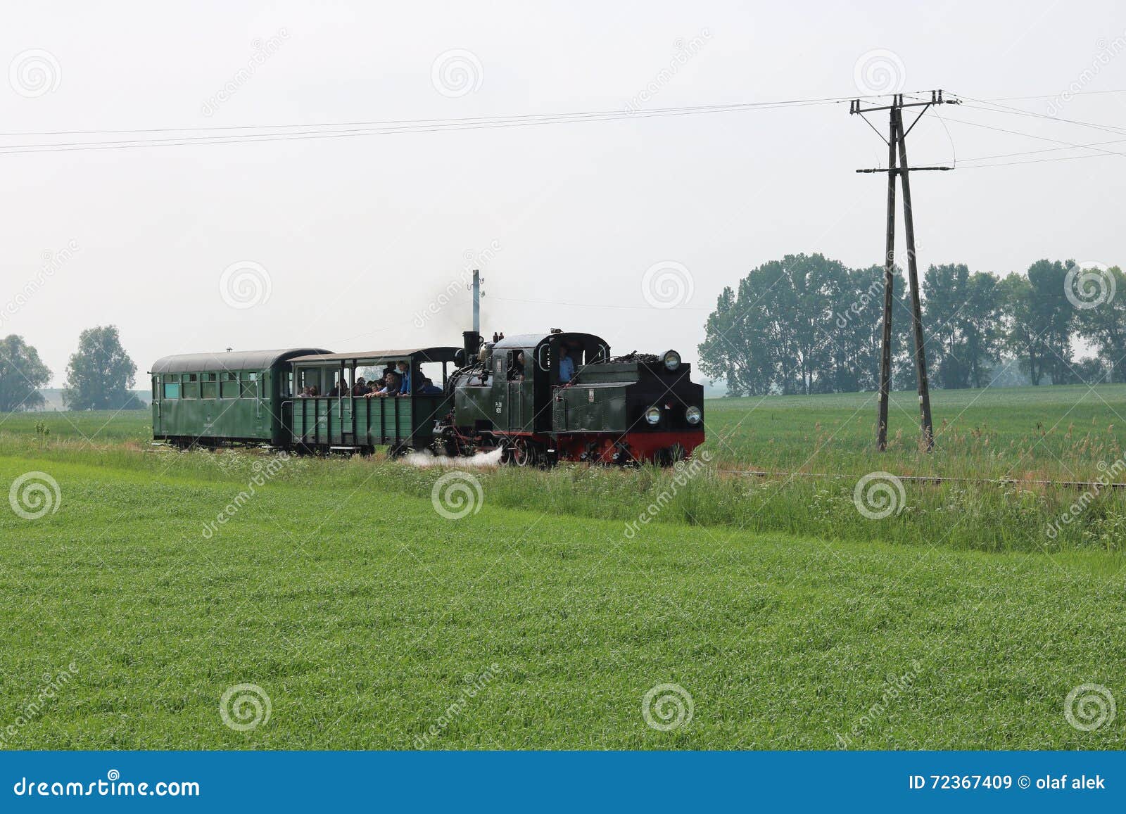 Steam locomotive - puffer editorial stock image. Image of grass - 72367409