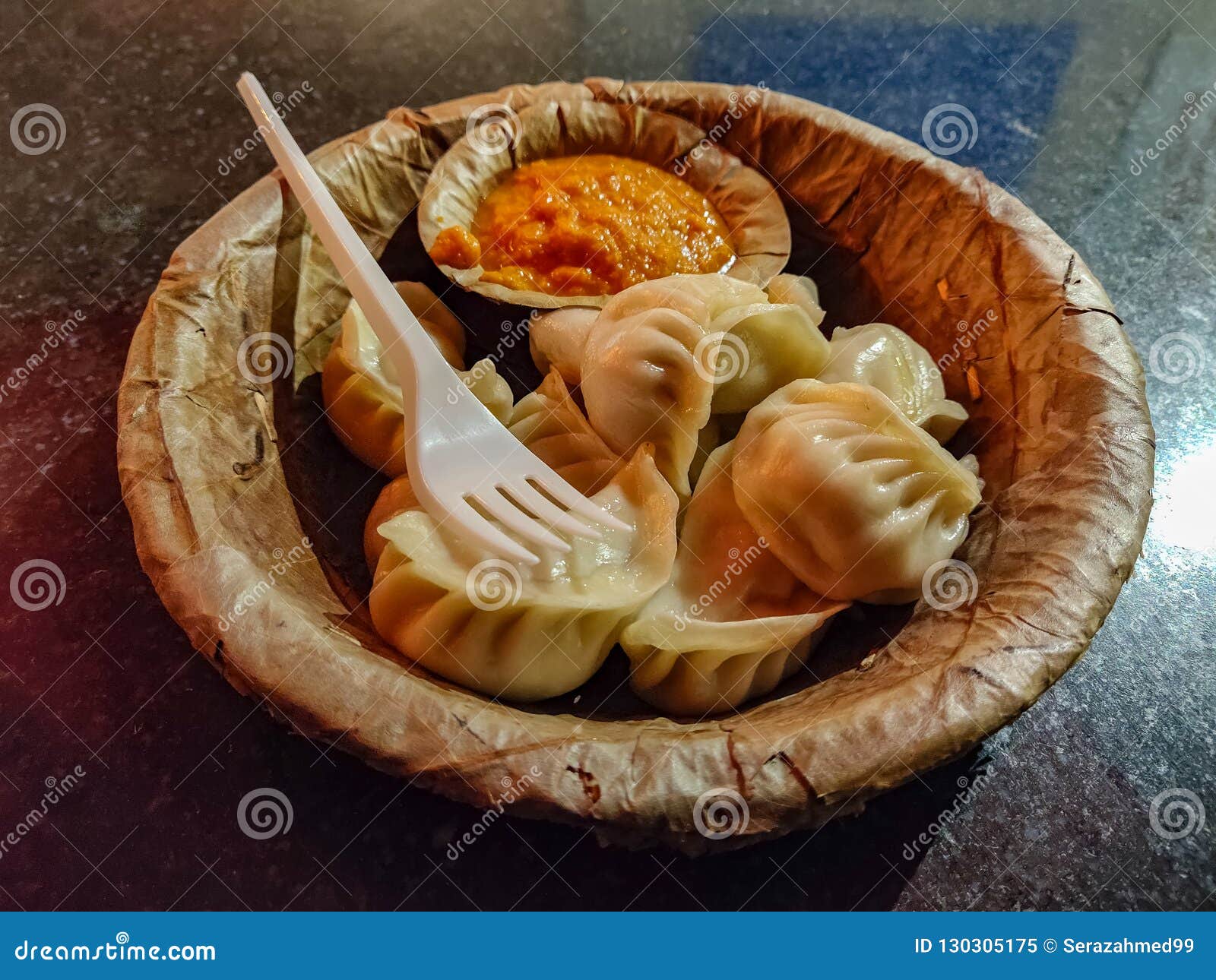 Steam momo in leaf plate stock image. Image of cooking - 130305175