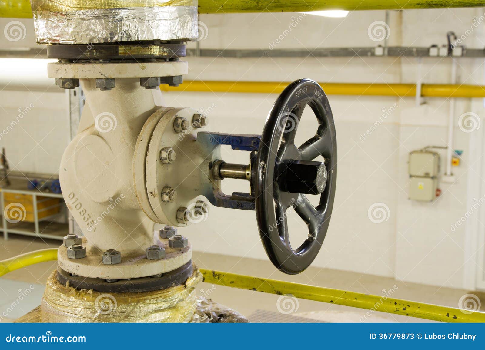 Steam pipe with a valve stock image. Image of piping - 36779873