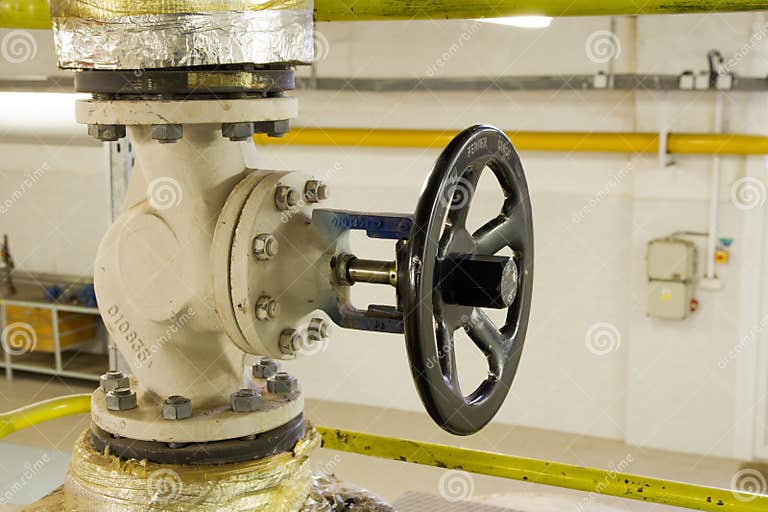 Steam pipe with a valve stock image. Image of piping - 36779873