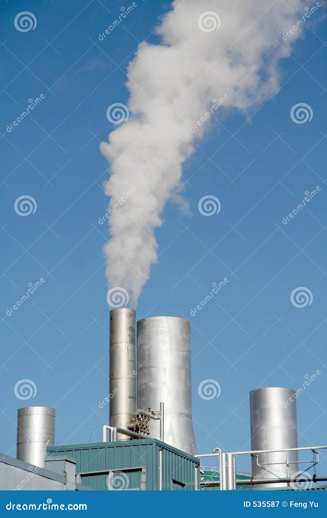 Steam rising from a tower stock image. Image of tube, factory - 535587