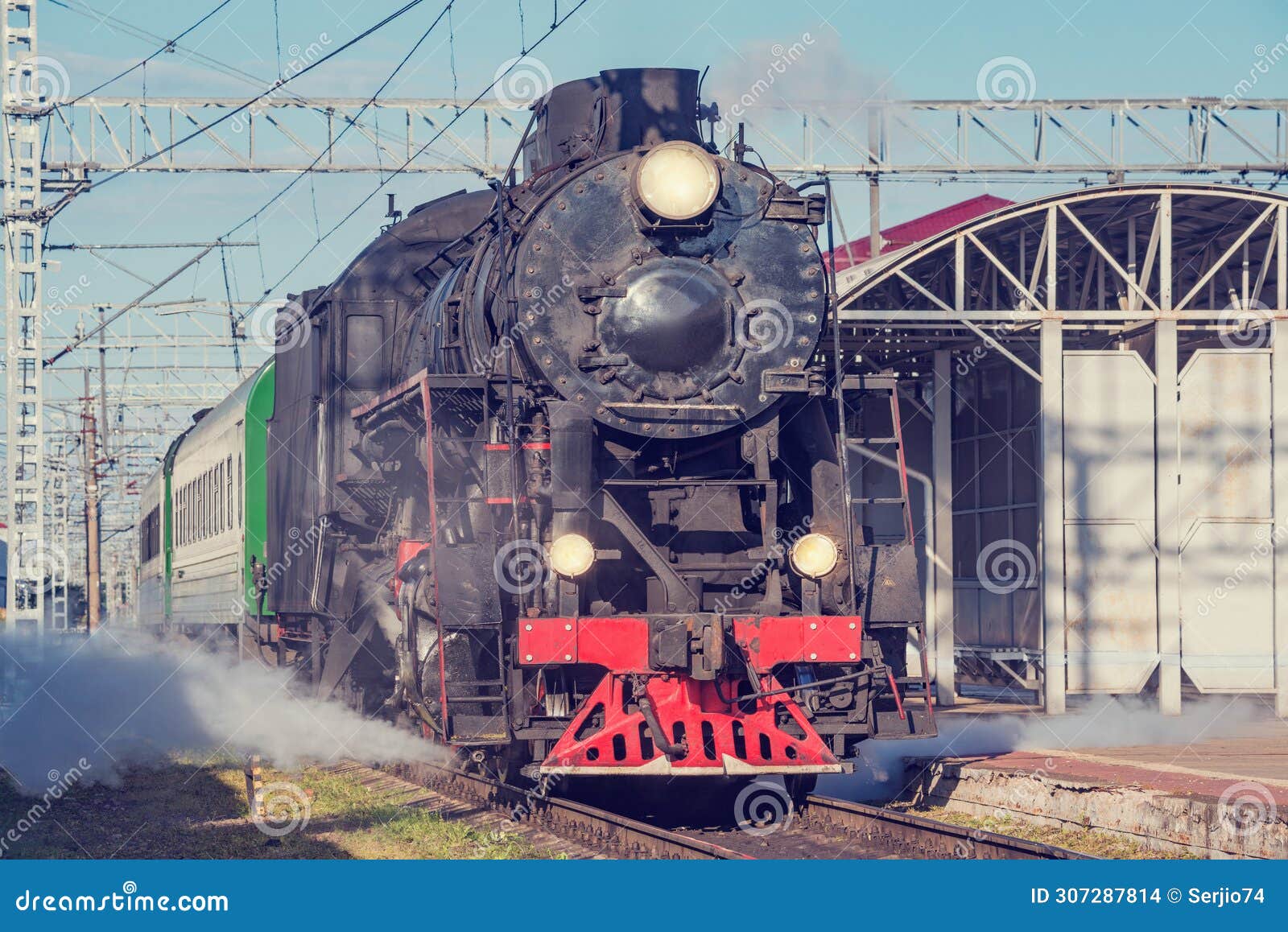 Steam Train Approaches To the Platform Stock Photo - Image of railroad ...