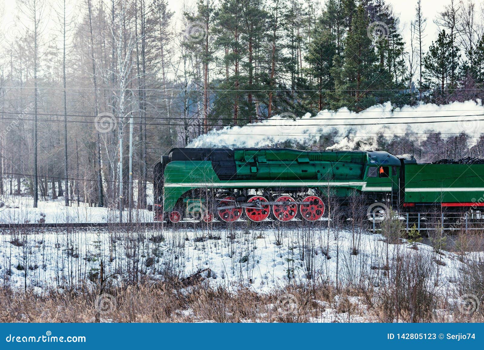 Steam train moves forward. stock image. Image of rail - 142805123