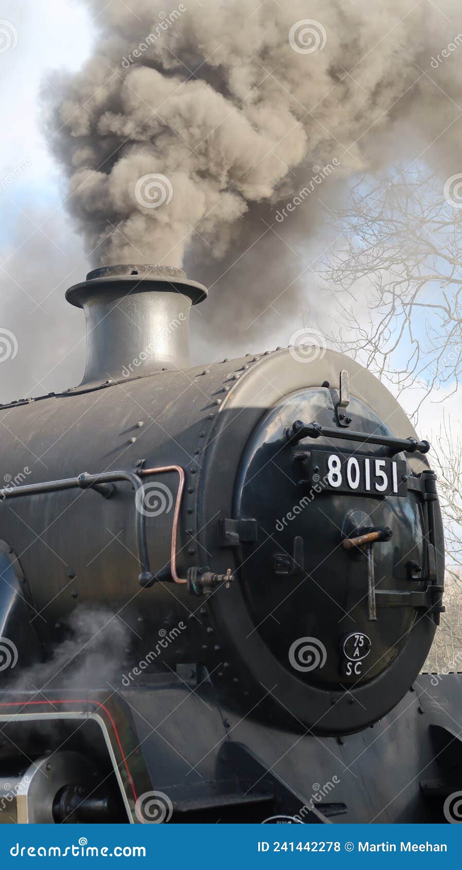 Steam Train with Smoke Billowing from Its Stack. Editorial Stock Photo ...