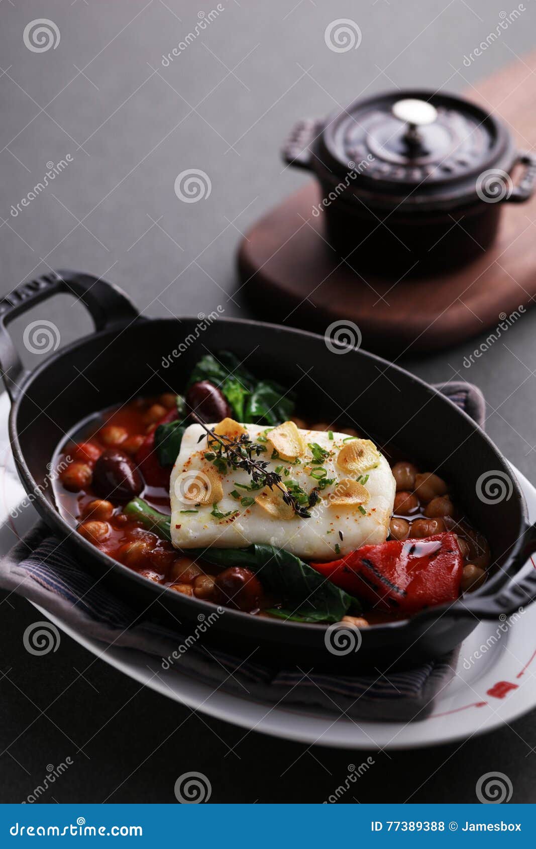 Steamed Atlantic Cod Saffron Braised with Bean on Black Stew Stock ...