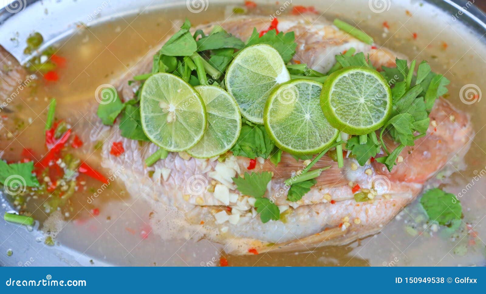 Steamed Basa Fish in Lime Dressing Stock Photo - Image of meal, lemon ...