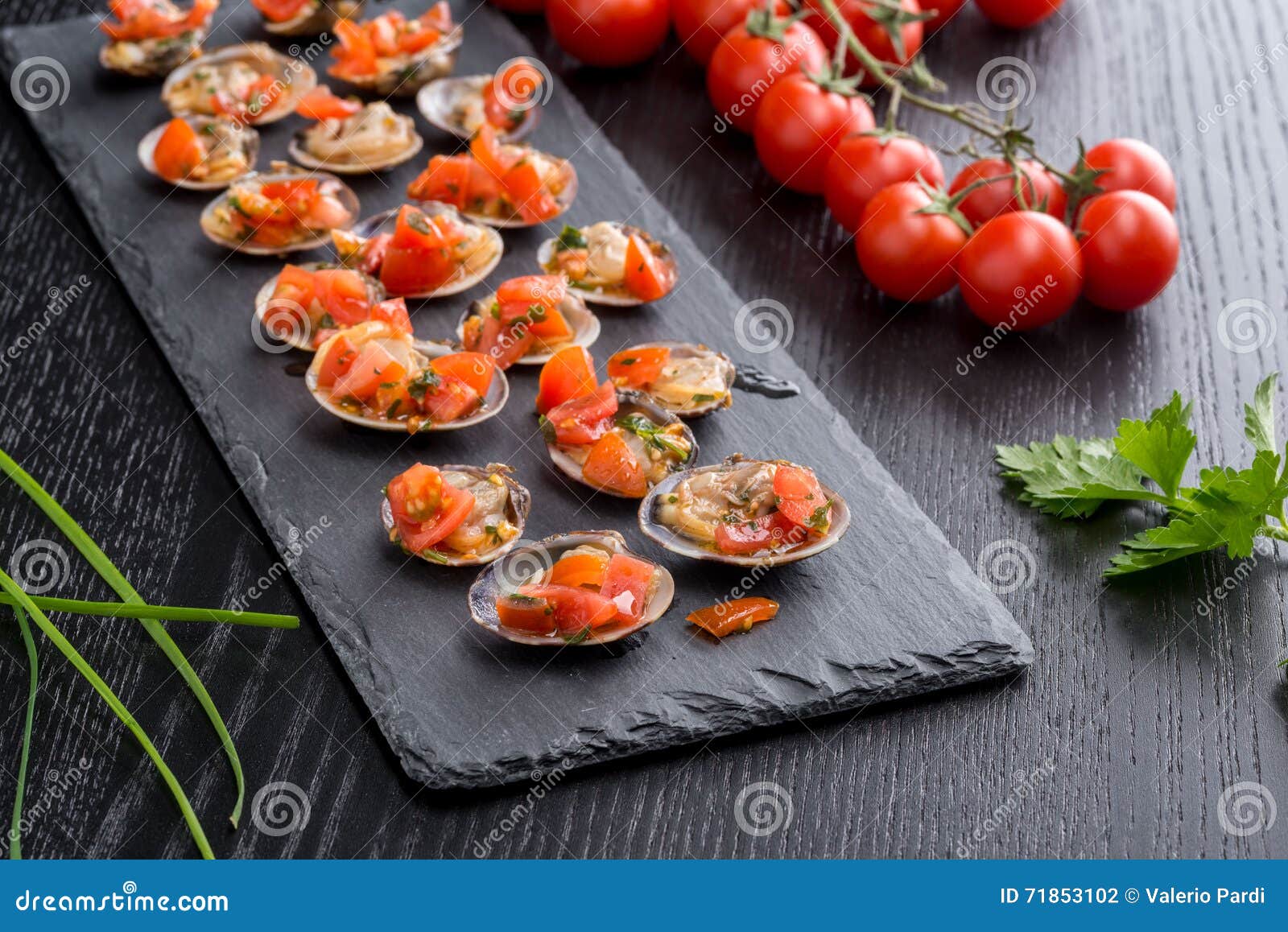 Steamed Clams Served with Chunks of Fresh Tomato and Parsley Stock ...