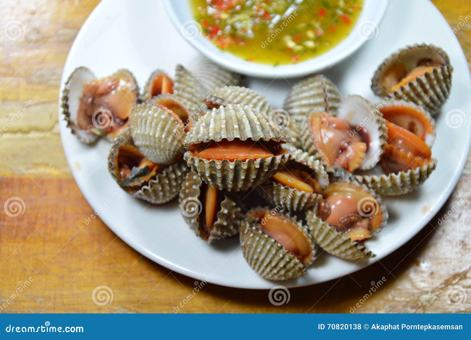 Steamed Cockle Boiled Cockles With Spicy Seafood Sauce In Transparent ...