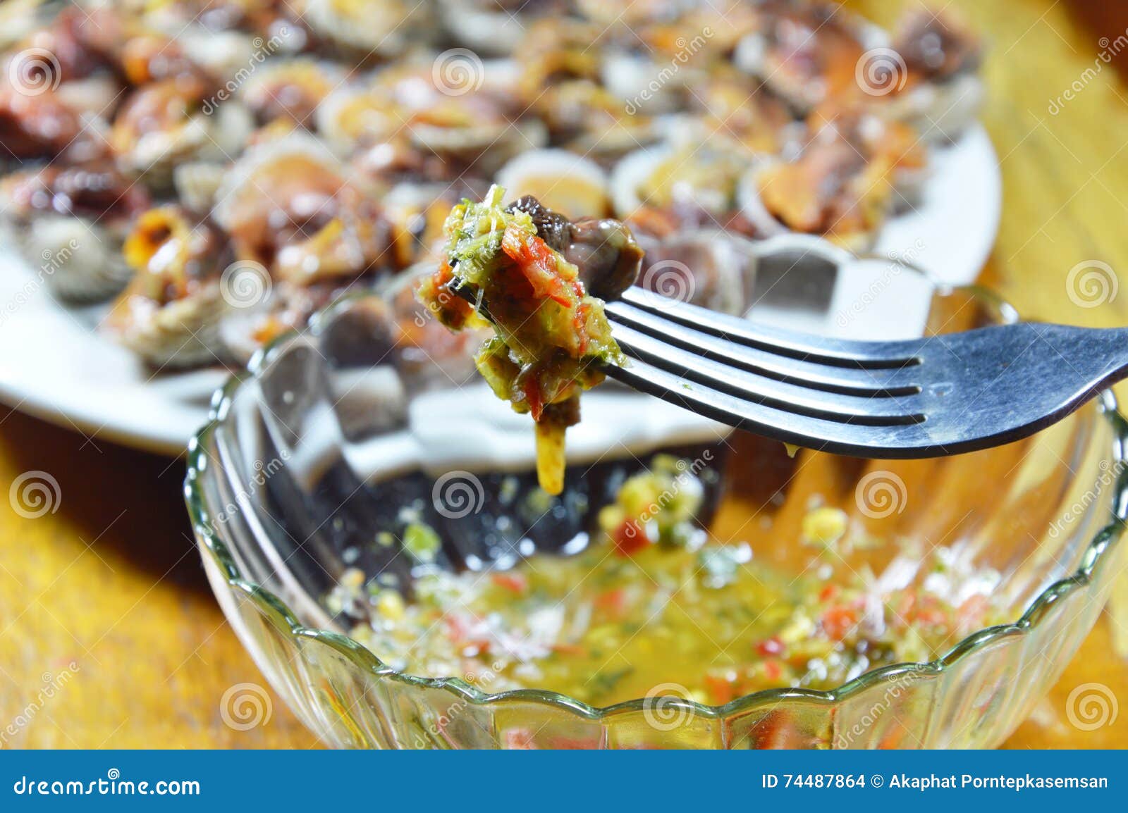 Steamed Cockle Stab on Fork with Spicy Dipping Sauce Stock Photo ...
