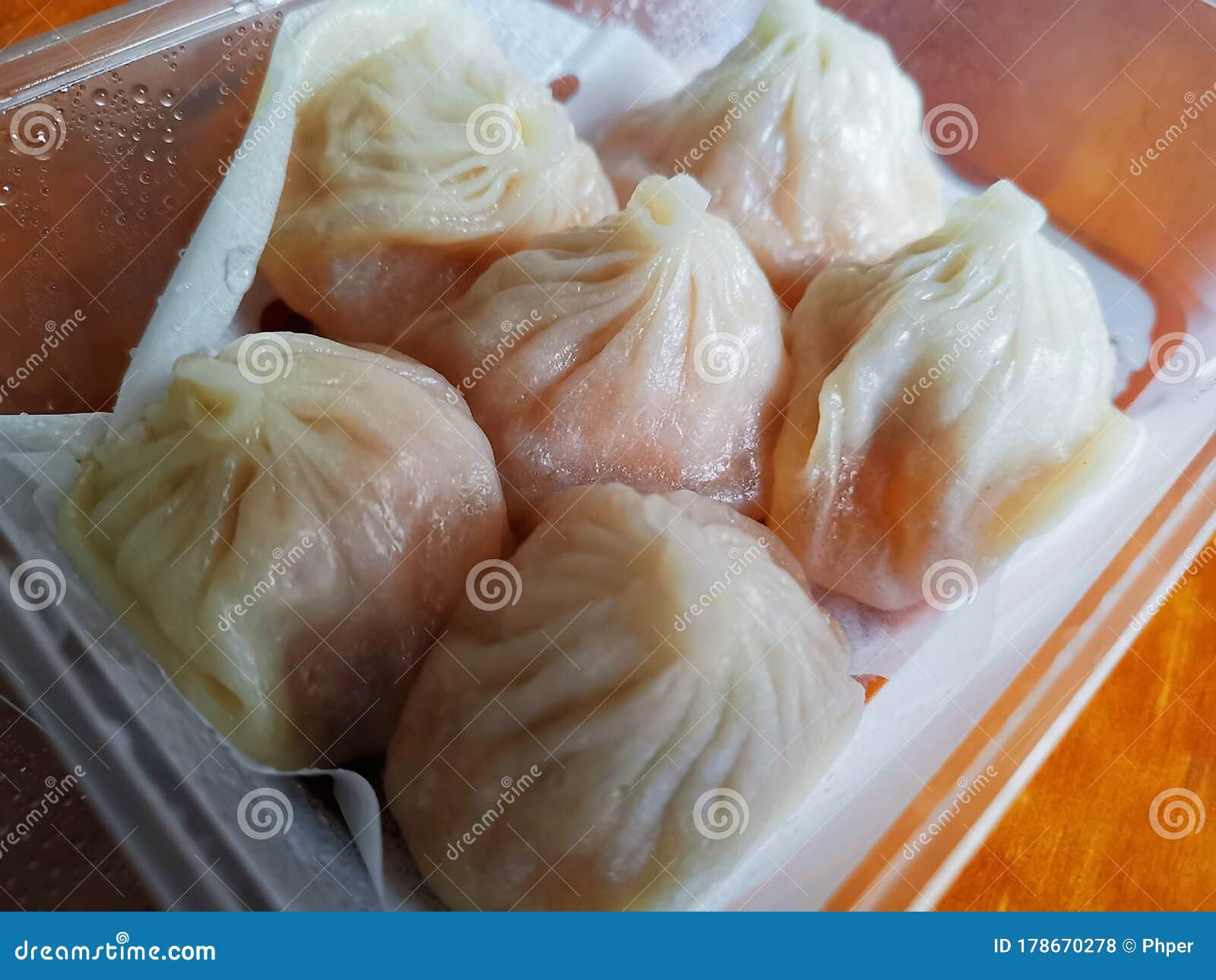 Steamed Dumplings in a Takeaway Container Stock Photo - Image of ...