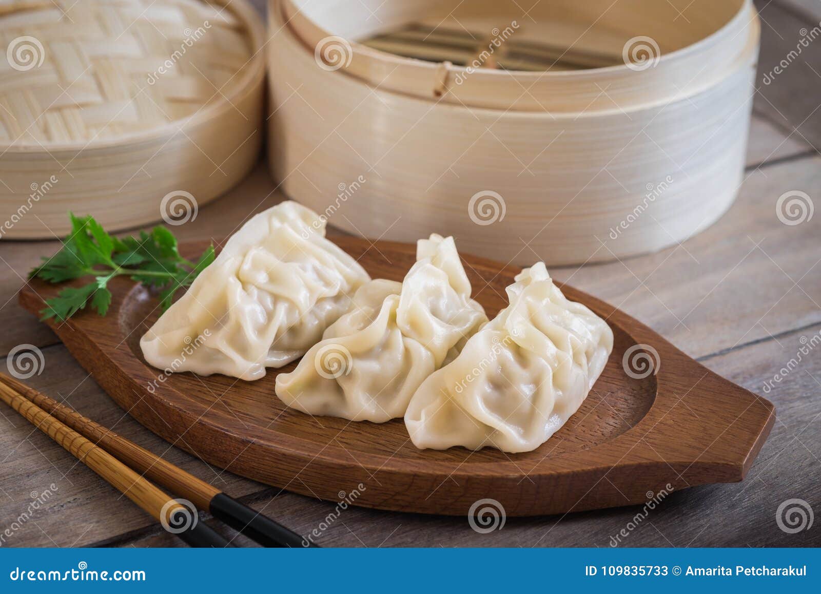 Steamed Dumplings on Wooden Plate Stock Image - Image of gyoza, cuisine ...