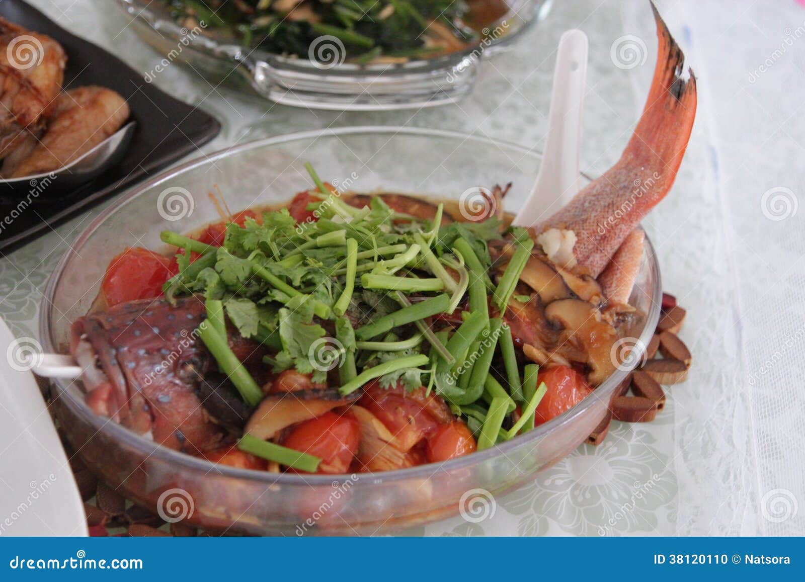 Steamed Fish Arranged on a Glass Platter Stock Photo - Image of ...