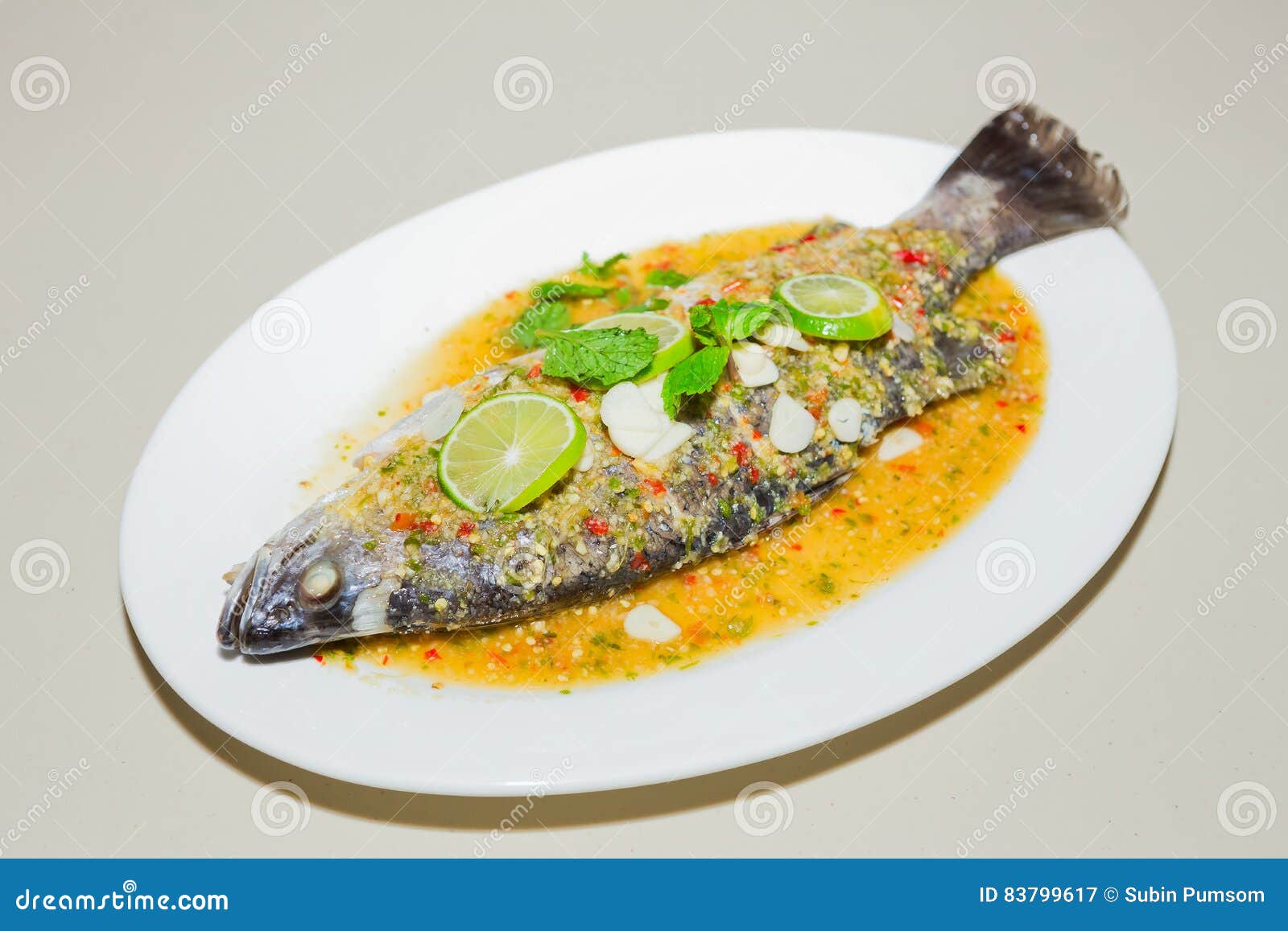 Steamed Fish in Lemon Sauce. Delicious, fresh. - Stock Image - Everypixel