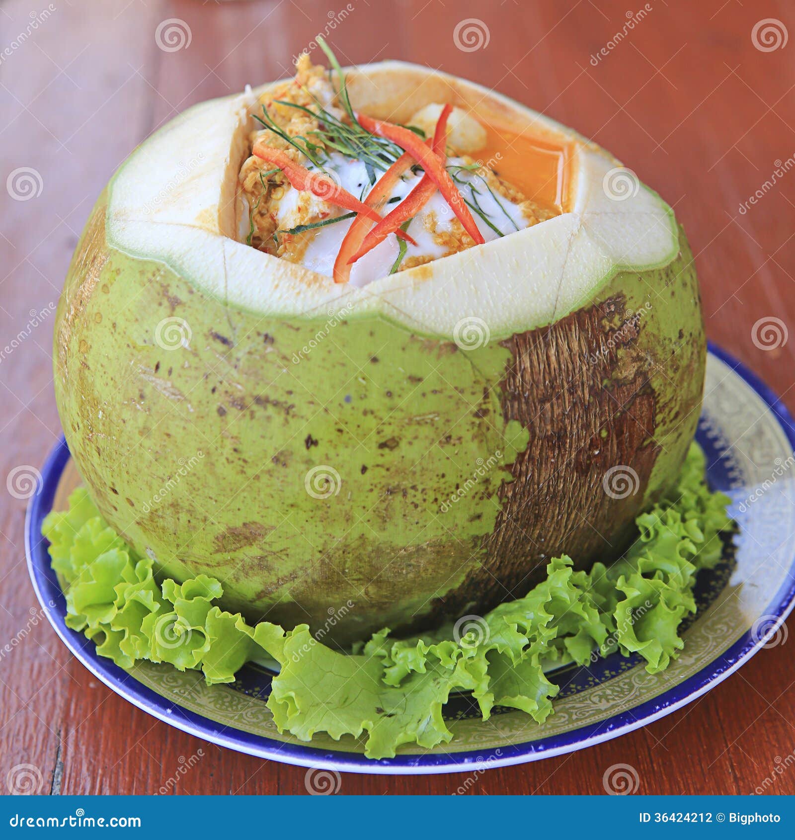 Steamed Fish and Seafood with Curry Paste in Coconut Stock Photo ...