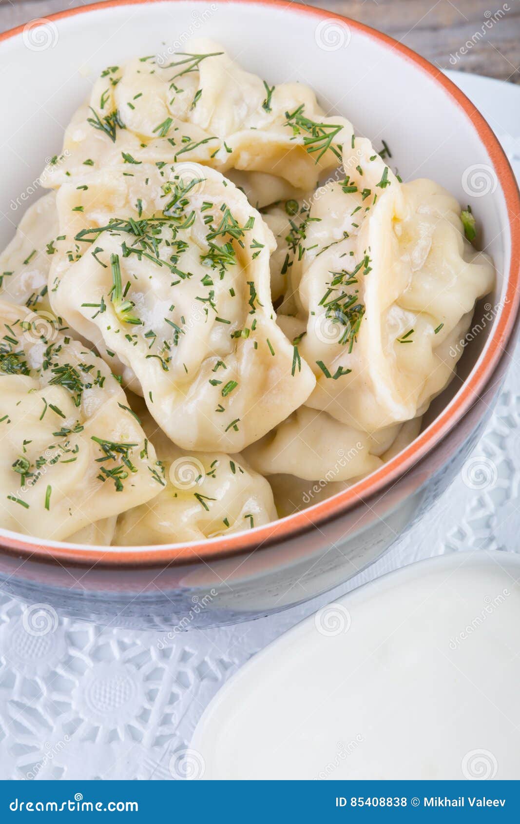 Steamed gyoza in a bowl stock photo. Image of homemade - 85408838