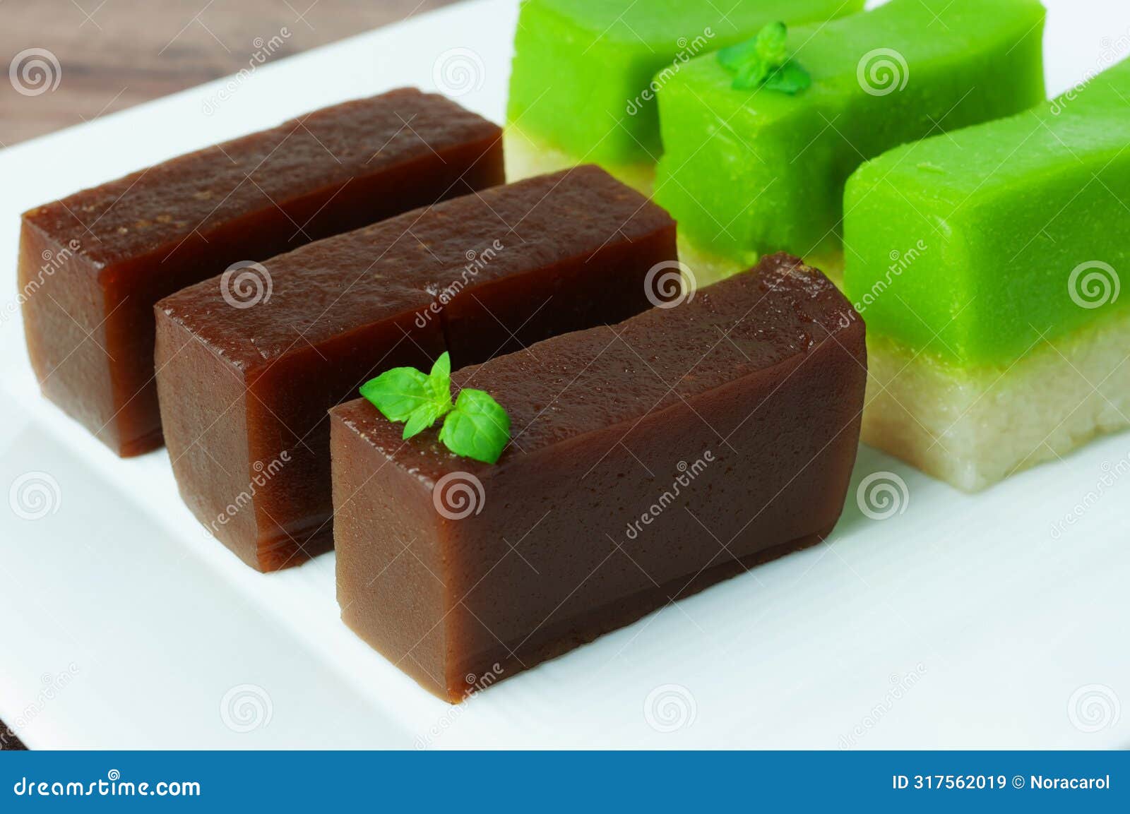 Steamed Palm Sugar Cake and Pandan Tray Cake on a Plate Stock Image ...