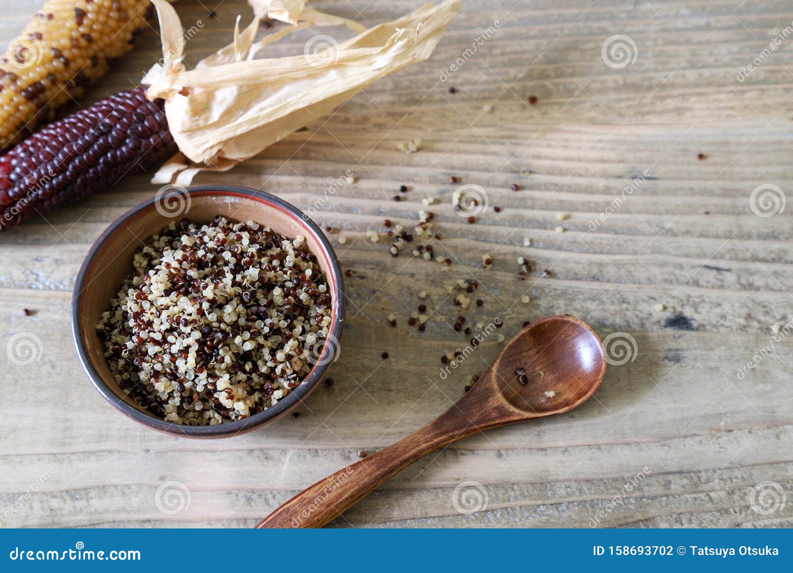 Steamed quinoa in the bowl stock photo. Image of table - 158693702