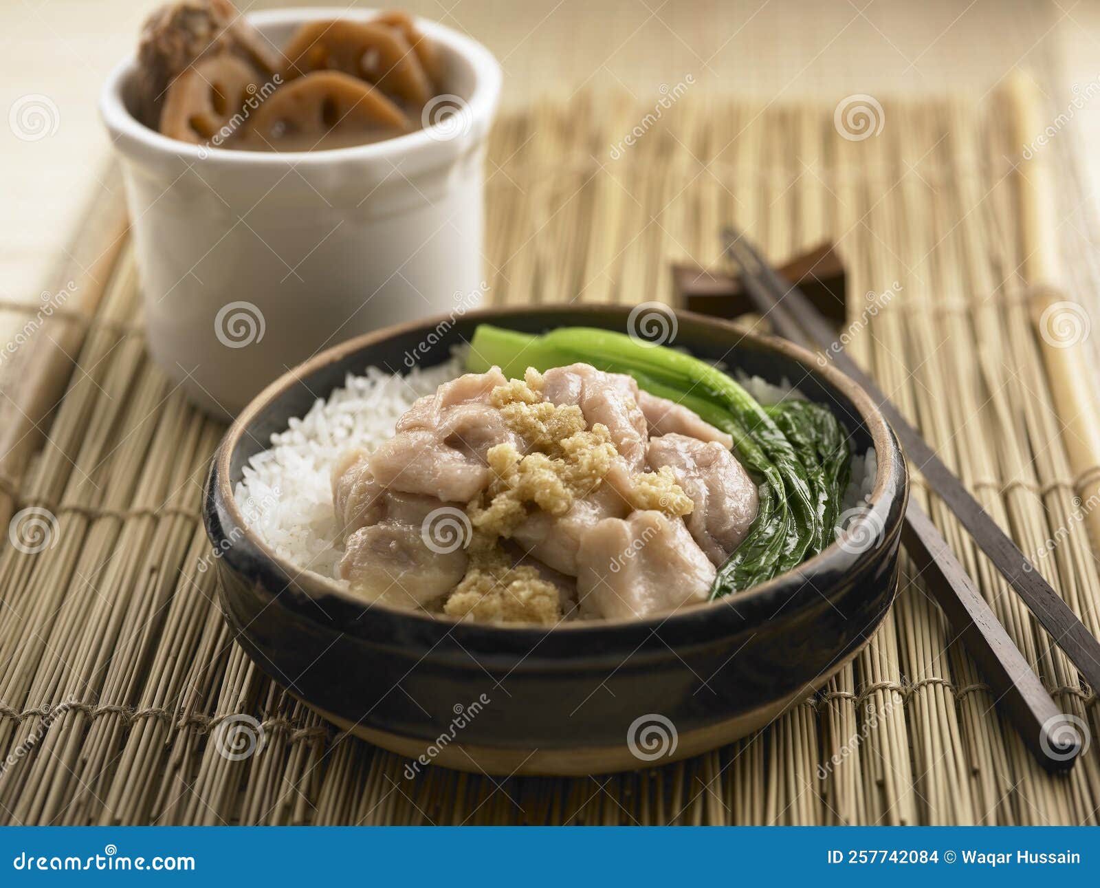 Steamed Rice with Chicken and Samsui Ginger Sauce Served in a Dish ...
