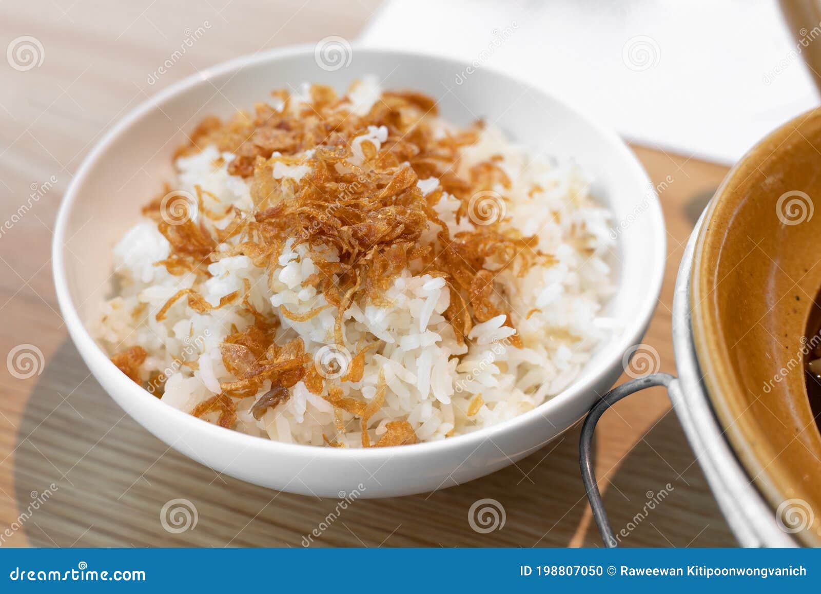 Steamed Rice Topped with Fried Shallots, Serving on White Bowl Stock ...