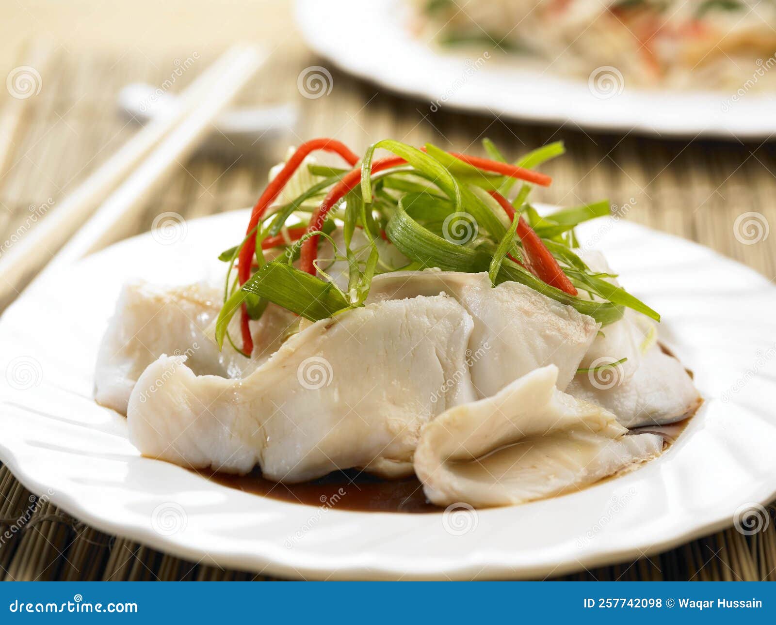 Steamed Sanyu or Steamed San Yu Served in a Dish Isolated on Table Side ...