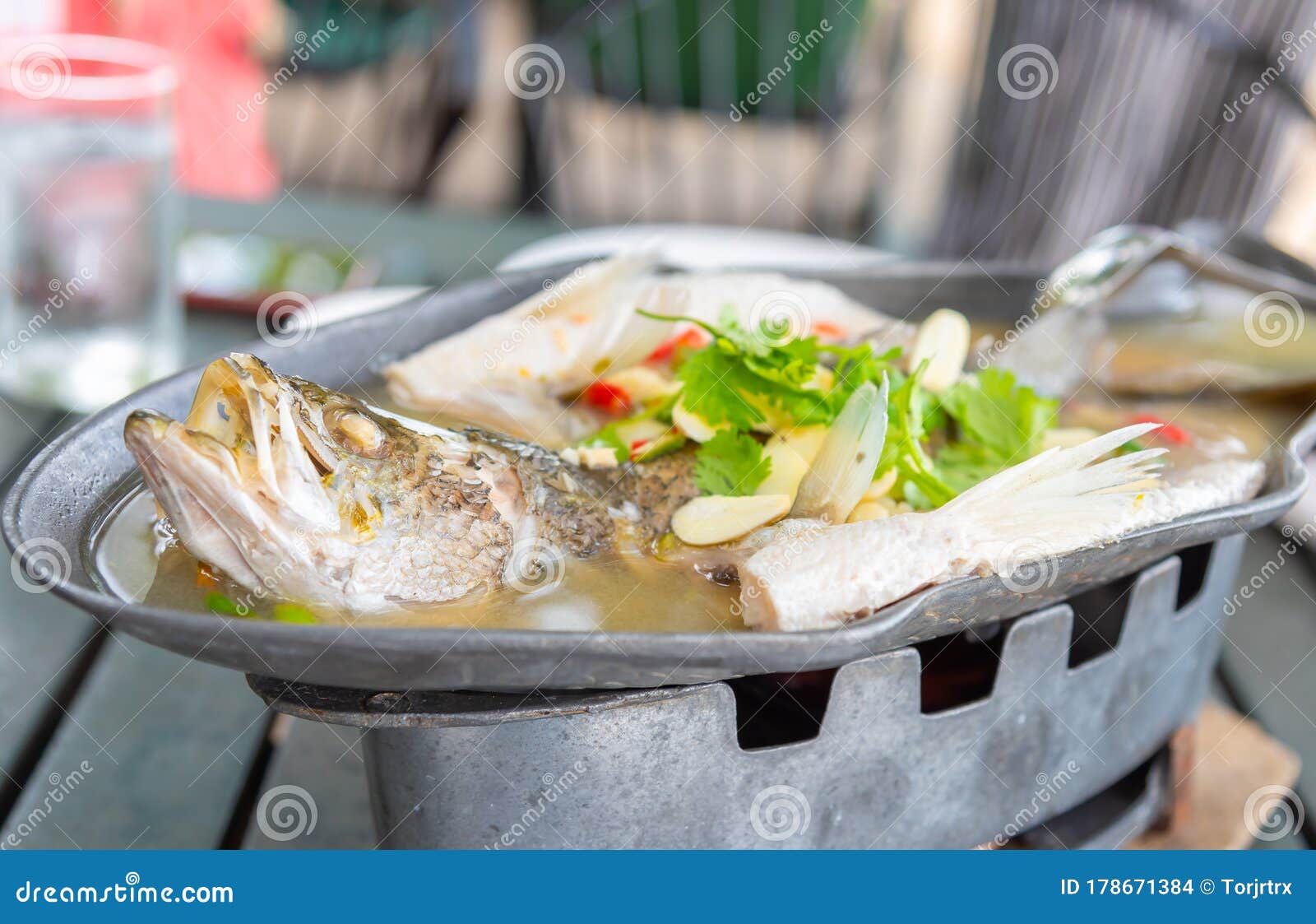 Steamed Snapper Fish with Lemon Served in a Hot Pot Stock Photo - Image ...