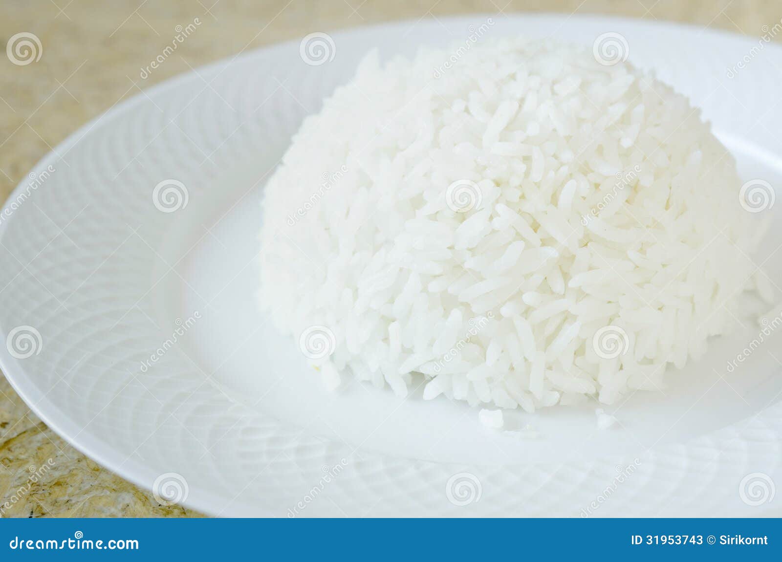 Steamed White Rice from Jasmin Rice with Fork on the White Plate Stock ...