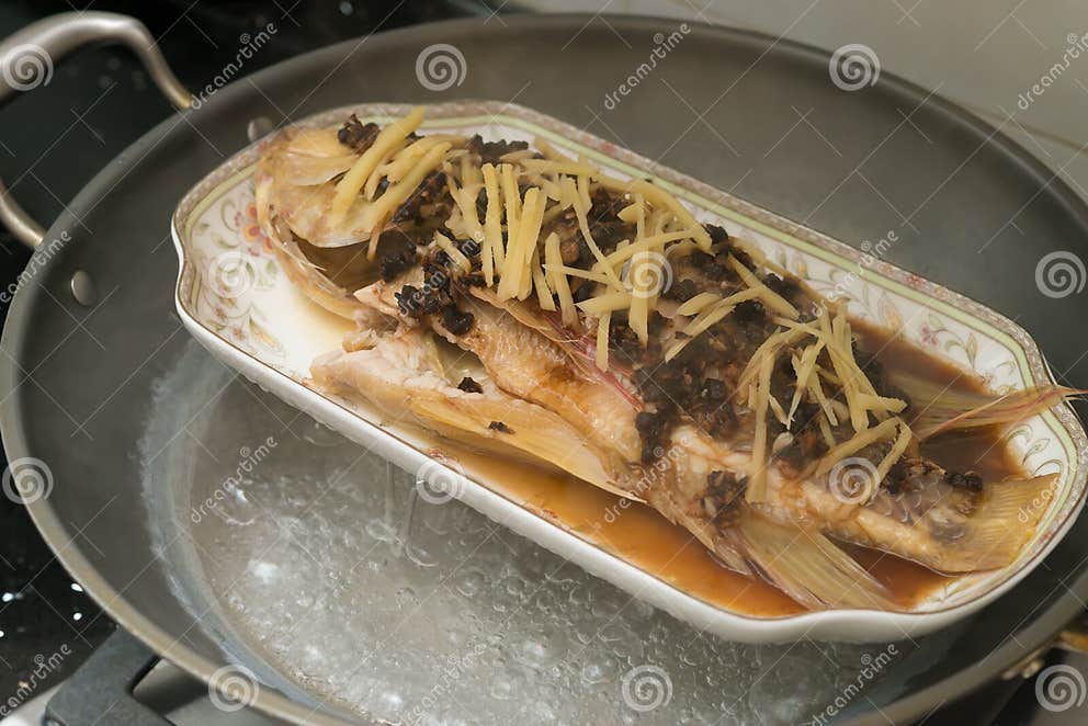 Steaming a Fresh Fish on a Pot Stock Image - Image of popular, quick ...