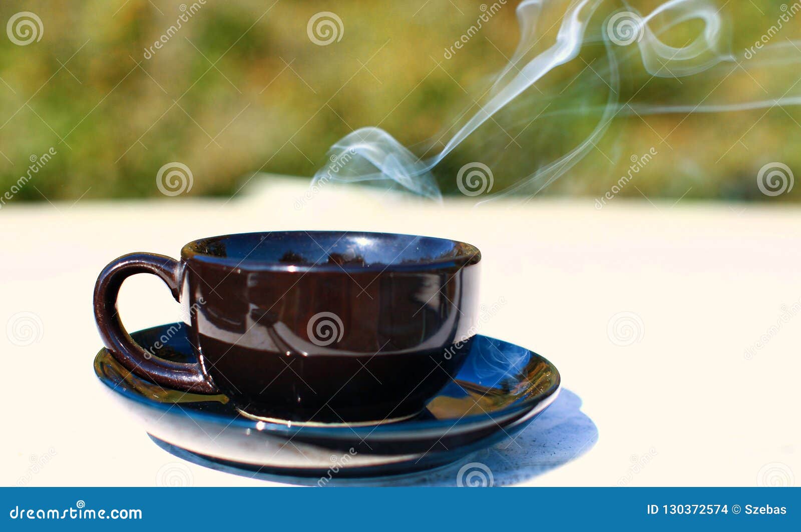 Steaming hot coffee cup stock photo. Image of ceramic - 130372574
