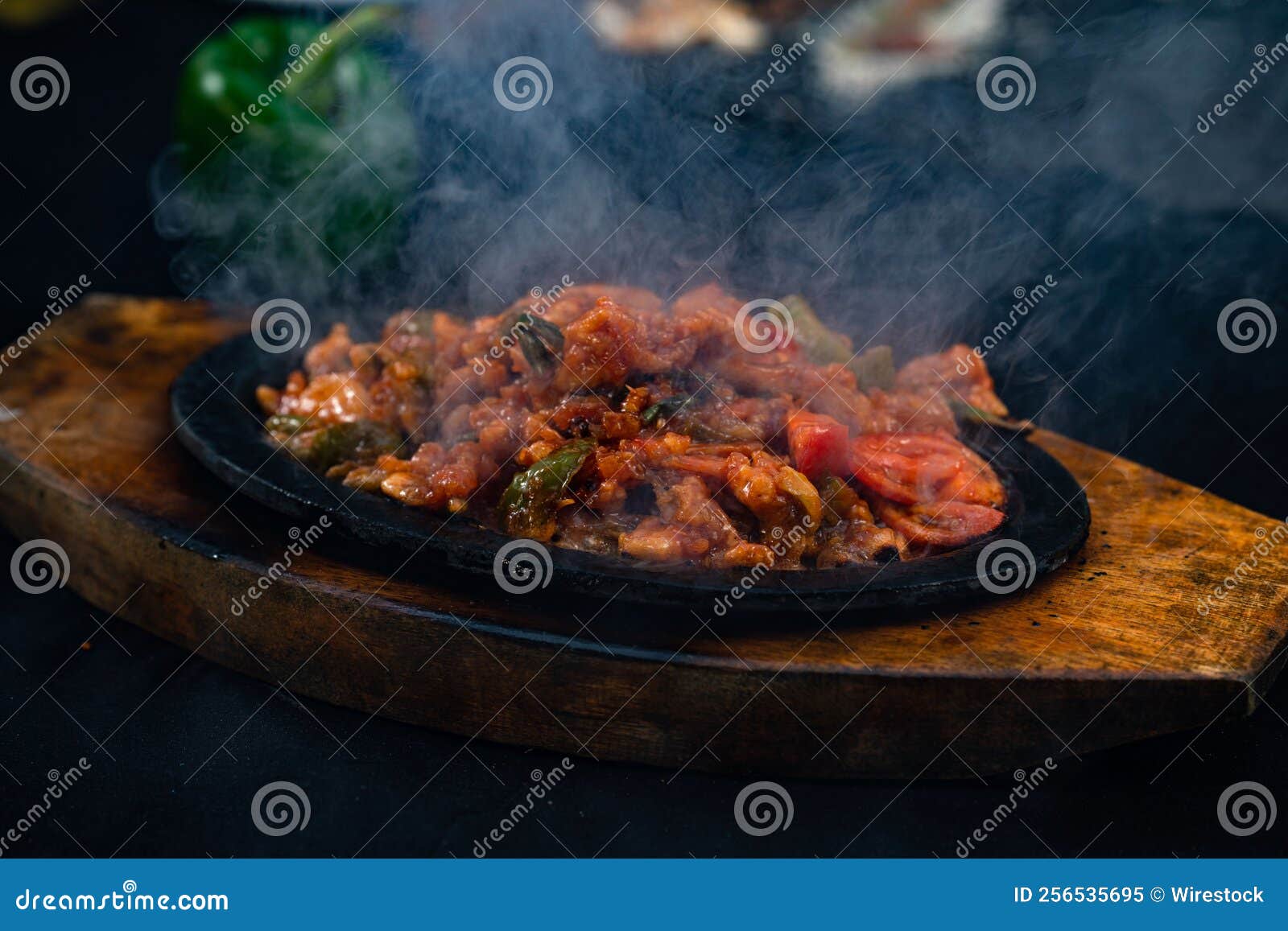 Steaming Hot Dish Served on a Wooden Platter Stock Image - Image of ...
