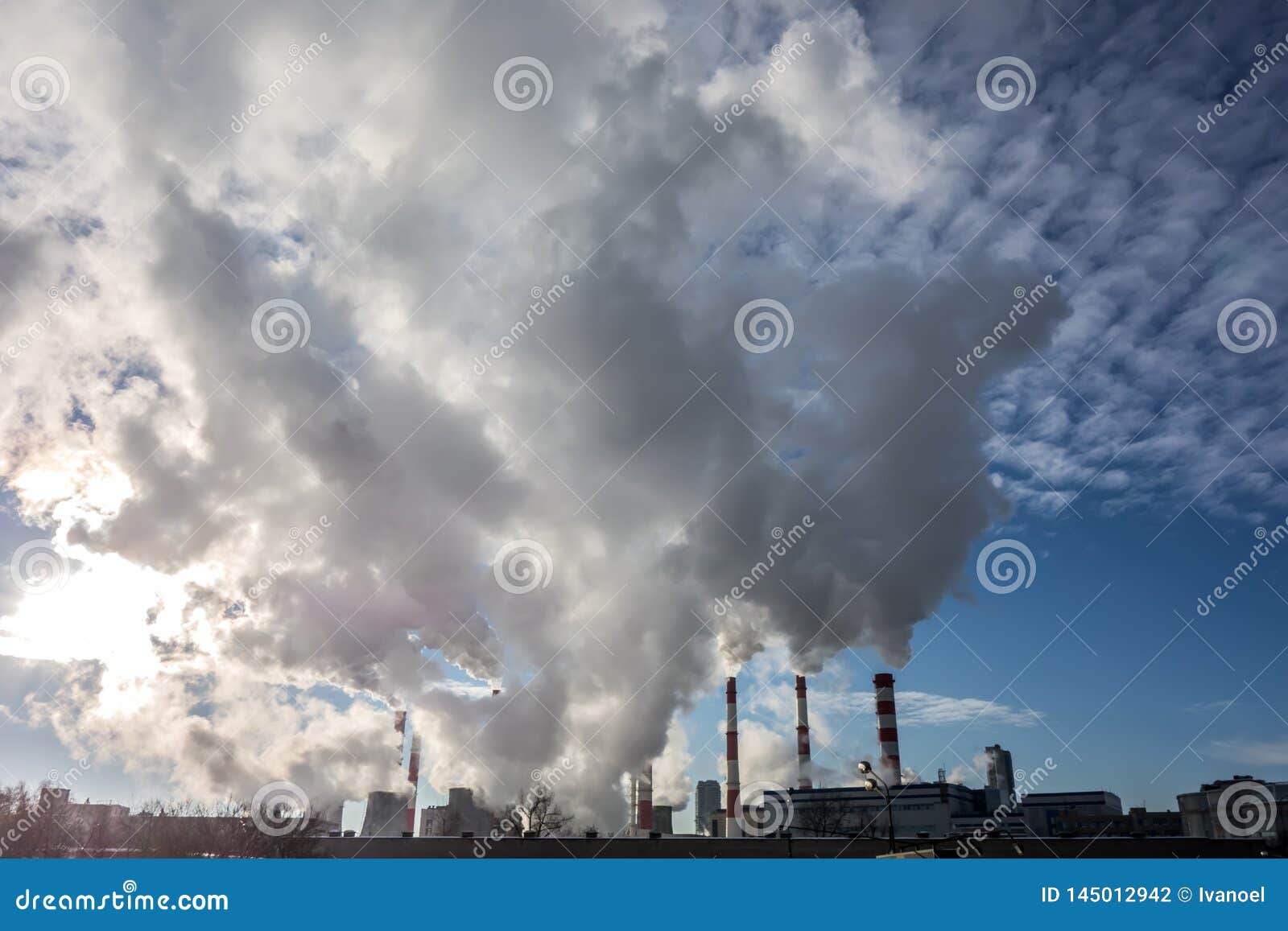 Steaming Smoke Stack and Cooling Tower with Pollution Stock Photo ...