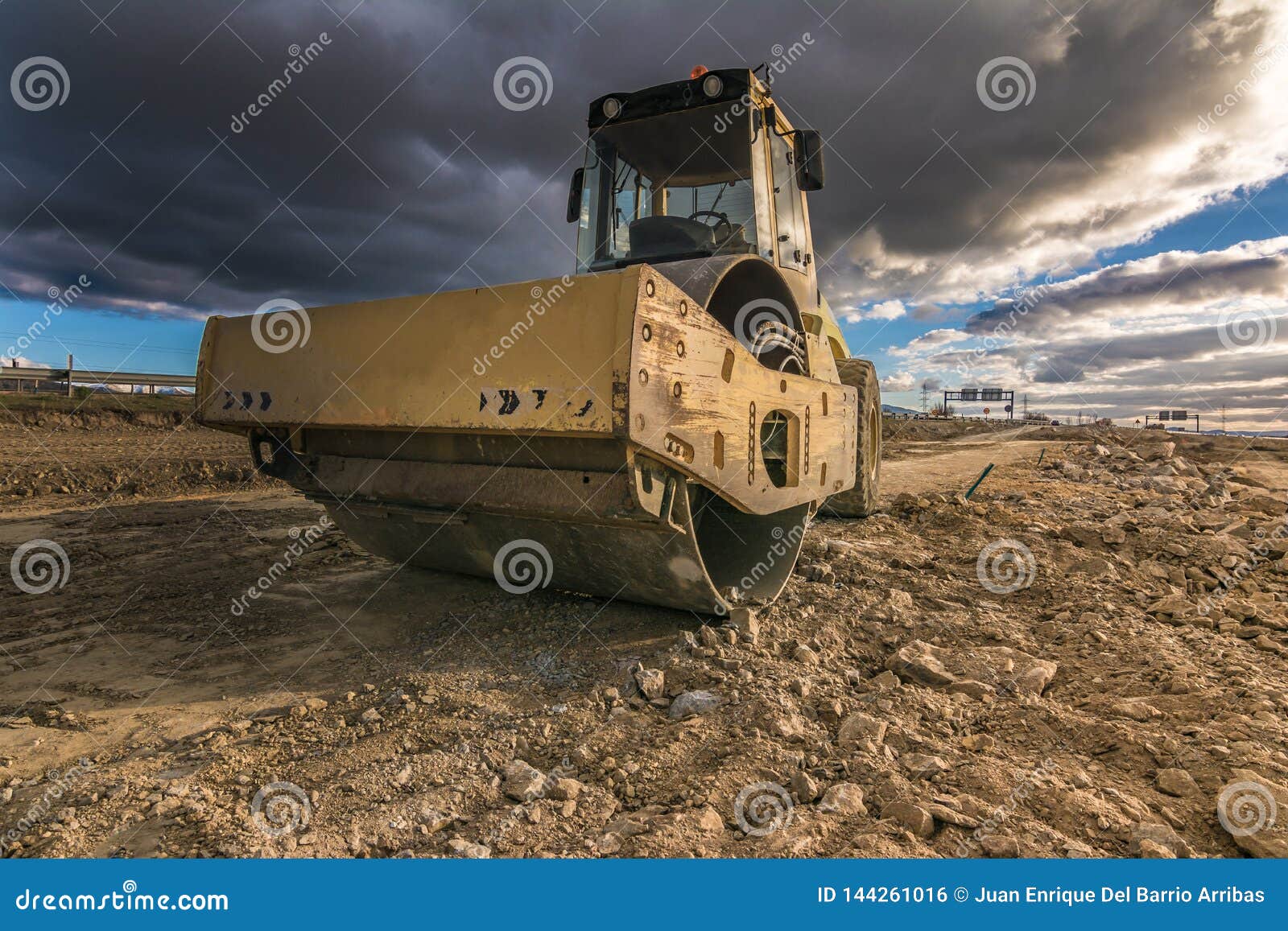 Steamroller Performing Leveling Work on a Road Under Construction Stock ...