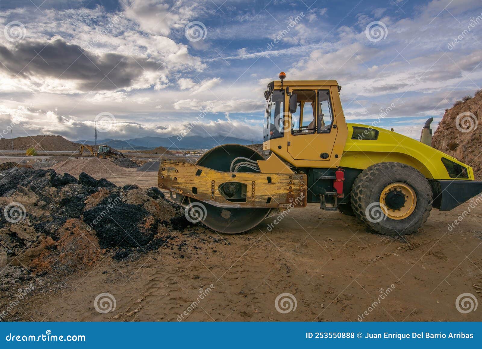 Steamroller at a Road Construction Site Stock Photo - Image of site ...