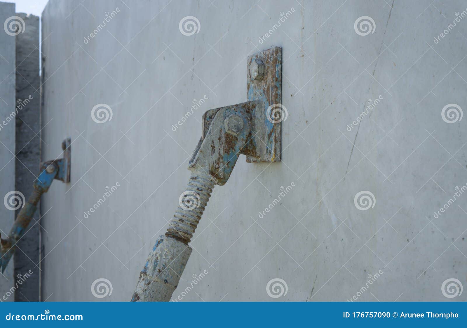 The Steel Arm Supporting on the Precast Concrete Wall Stock Photo ...