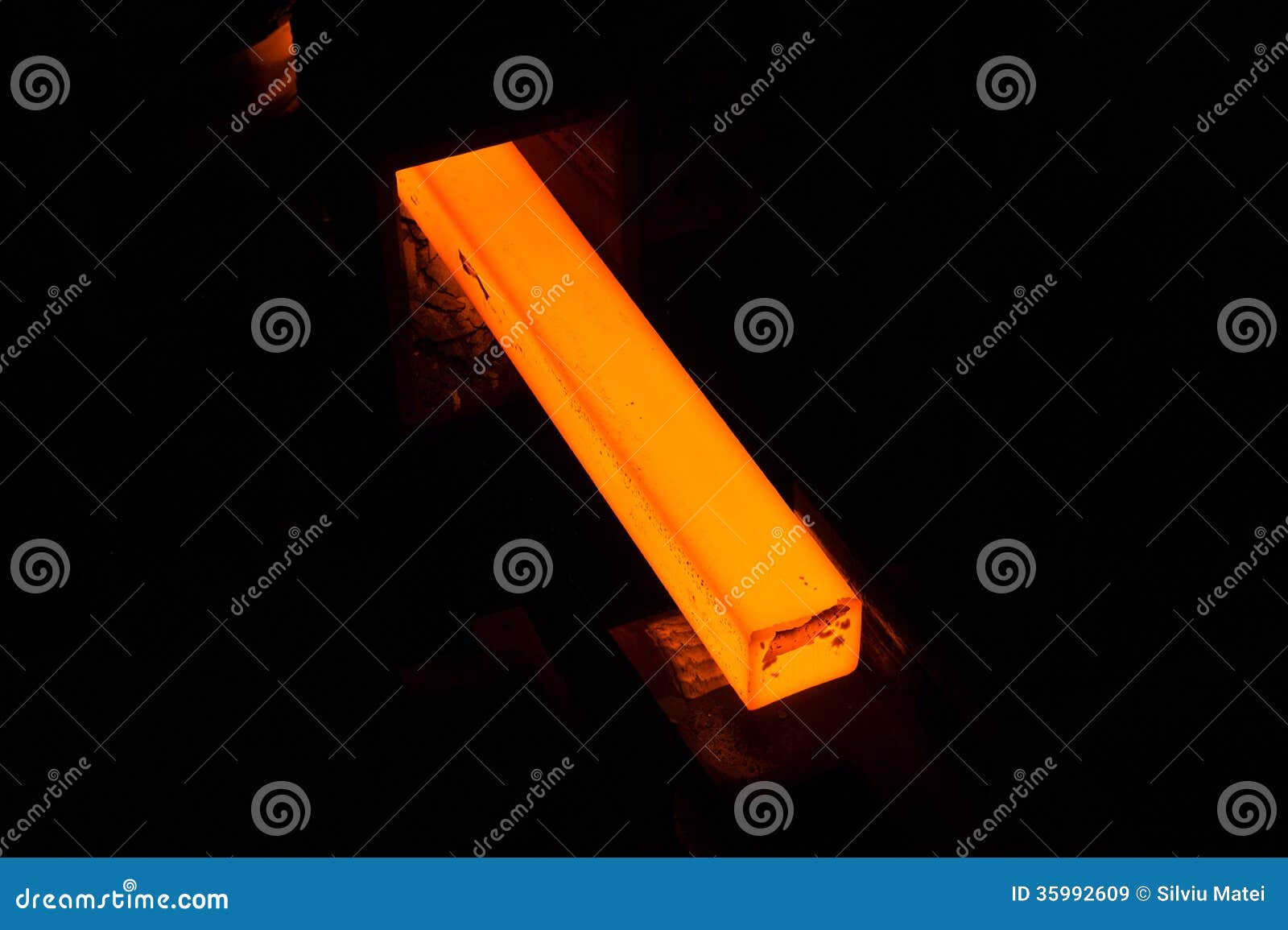Steel bar stock image. Image of manufacturing, burning - 35992609
