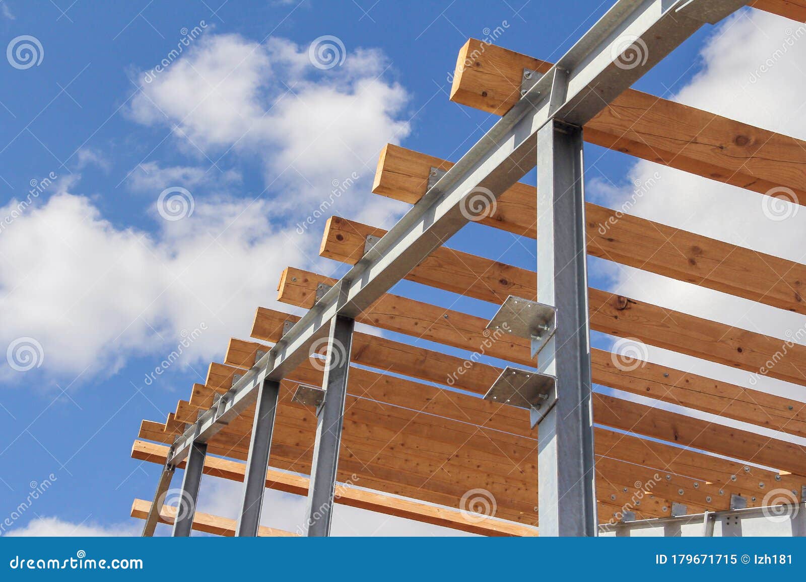 Steel Beam Structure on New Building Against the Blue Sky with Clouds ...