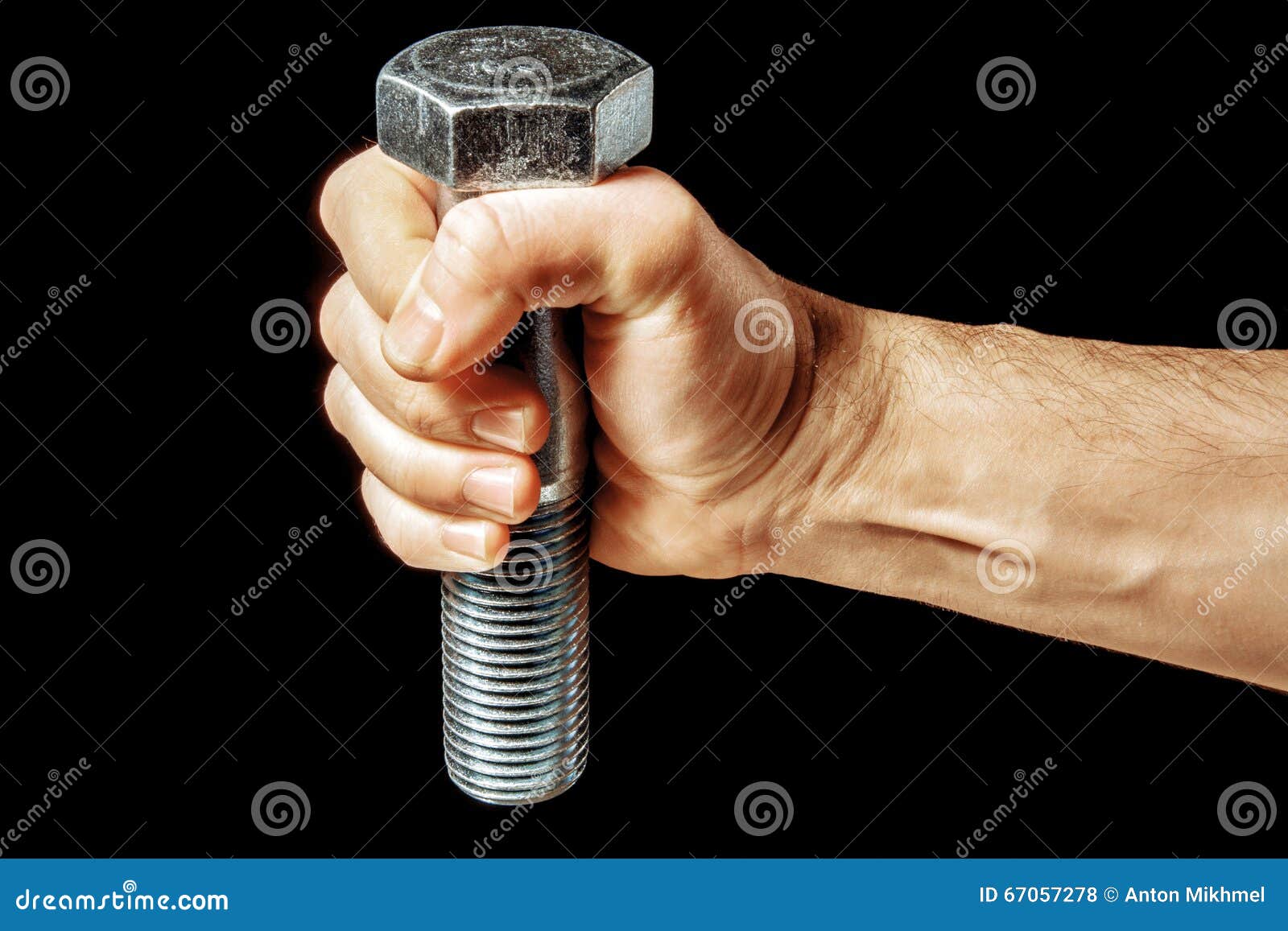 An steel bolt in male hand stock photo. Image of construction - 67057278