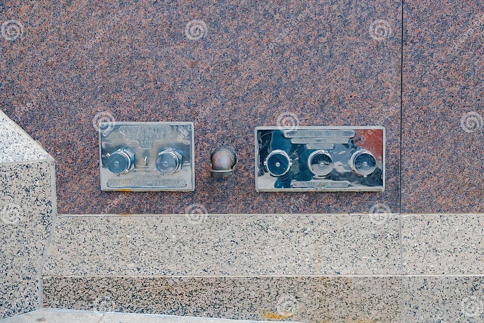 Steel, Chrome Fire Hydrant in Granite Wall of Modern Building Stock ...