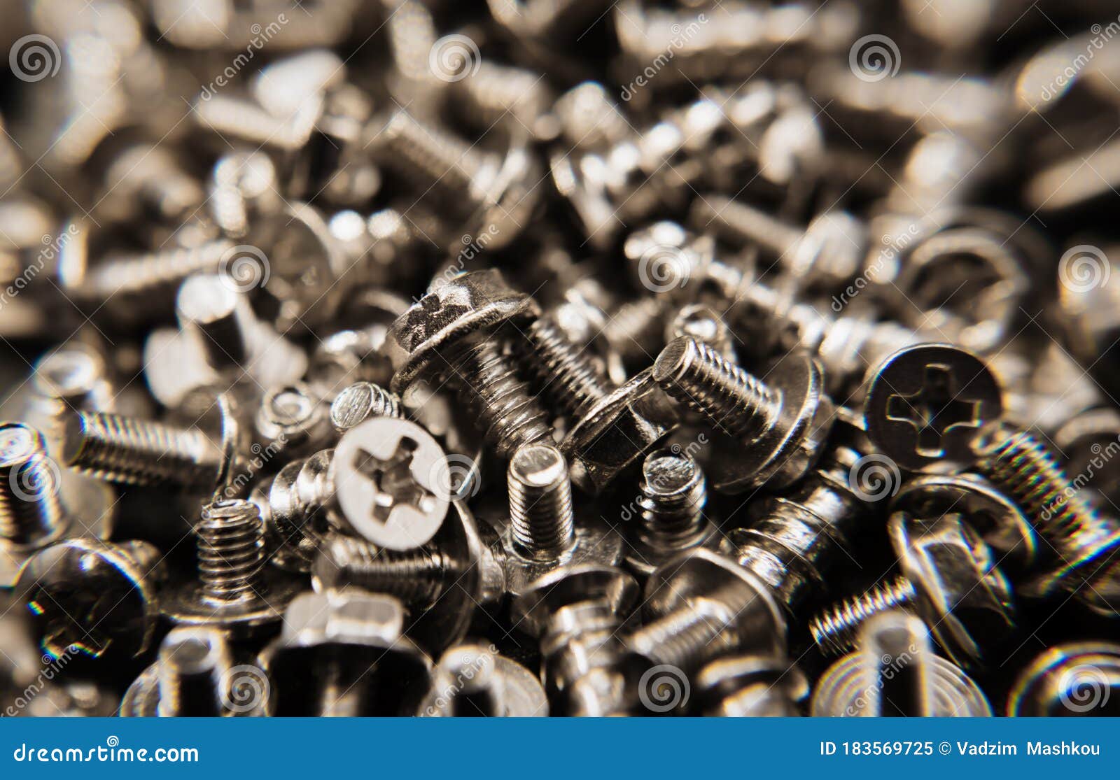 Steel Colored Screws are Scattered Over the Surface in Close Up Stock ...