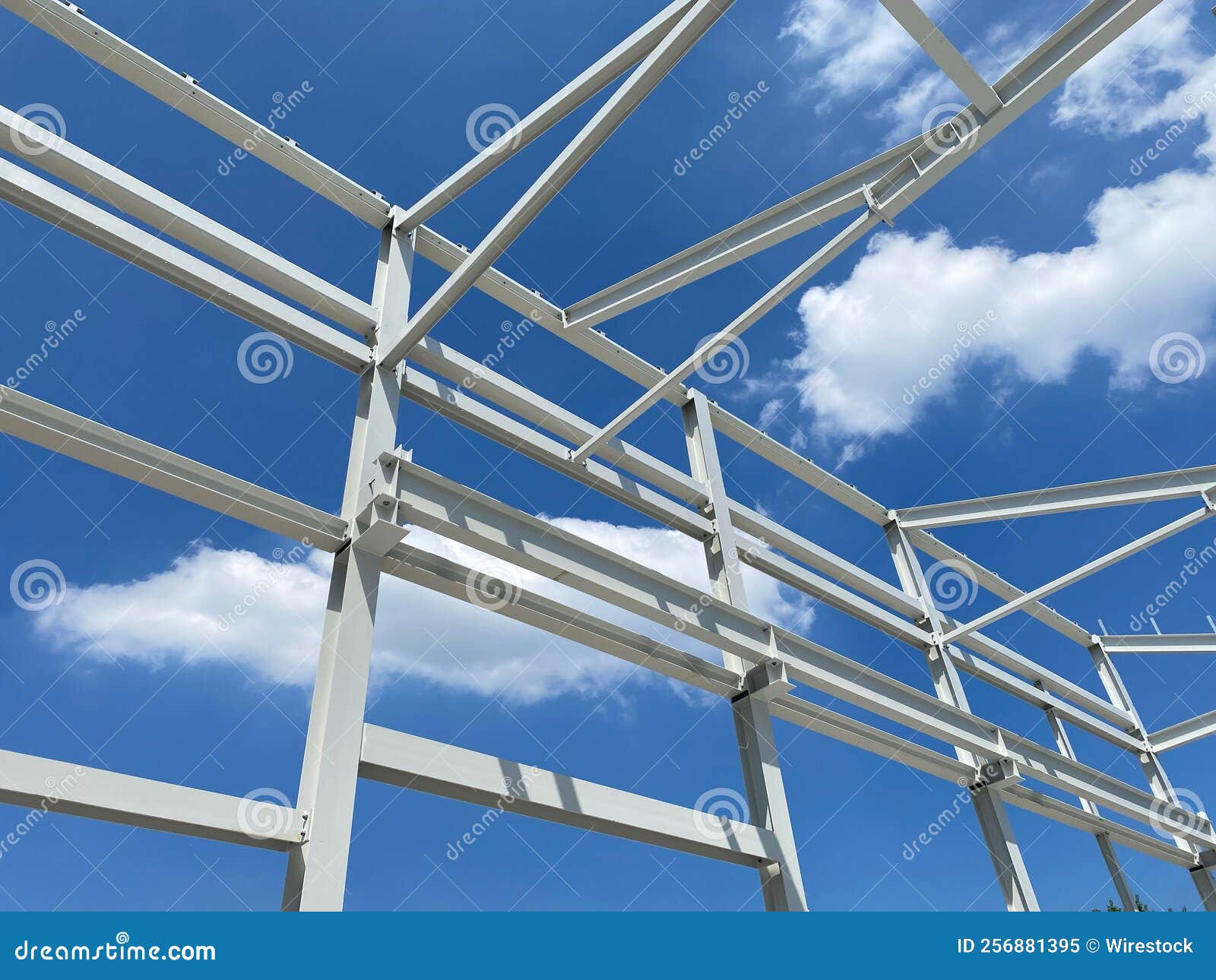 Steel Columns and Beams on a Construction Site Under a Blue Sky with ...