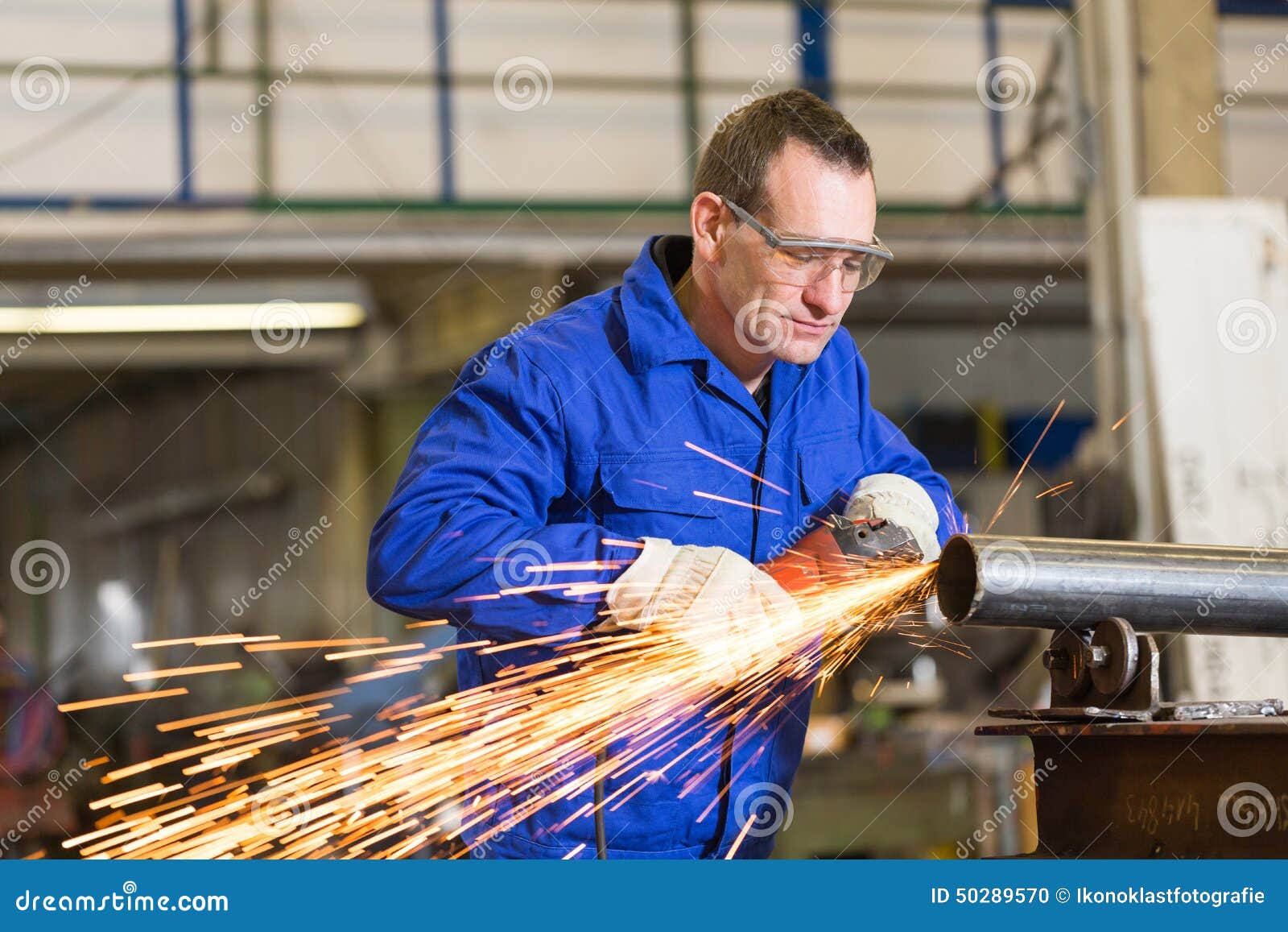 Steel Construction Worker Grinding Metal with Angle Grinder Stock Photo ...