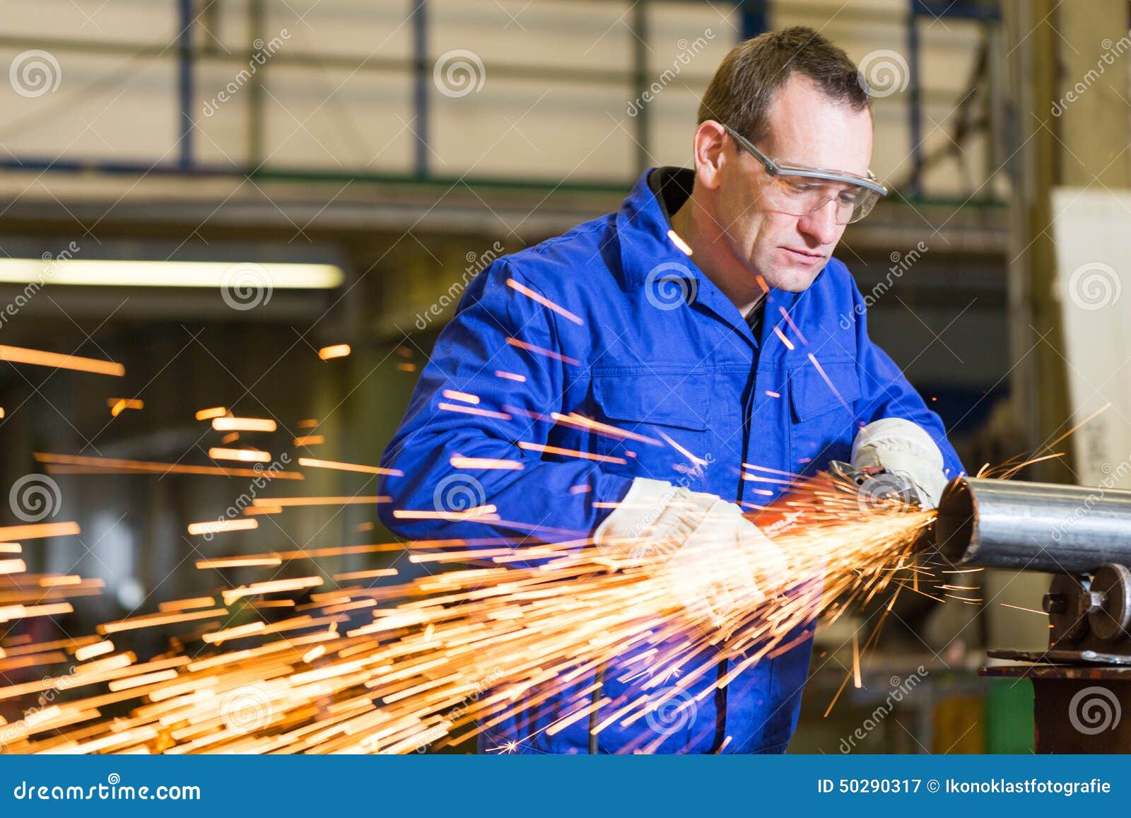 Steel Construction Worker Grinding Metal with Angle Grinder Stock Image ...