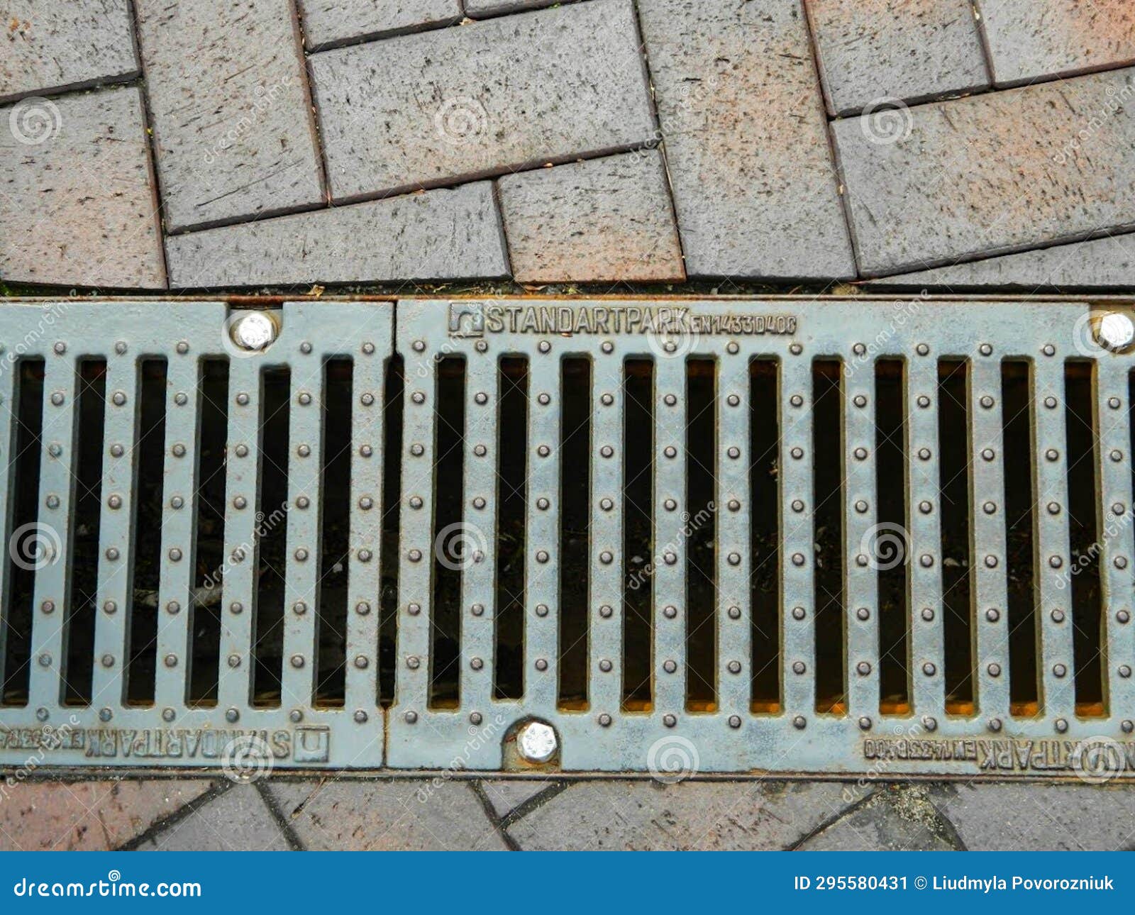 Steel Drain Grate on the Tile Pathway in the Large University ...
