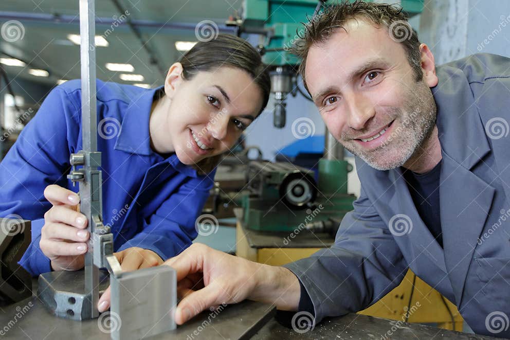 Steel Factory Apprentice and Instructor Smiling Stock Image - Image of industrial, bluey: 317244455