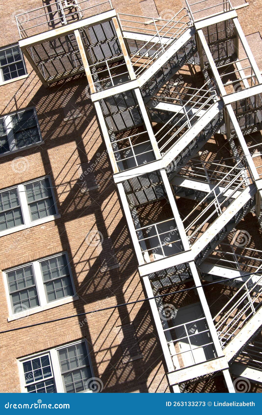 An Outdoor Fire Escape on the Back Side of an Apartment Building Stock ...