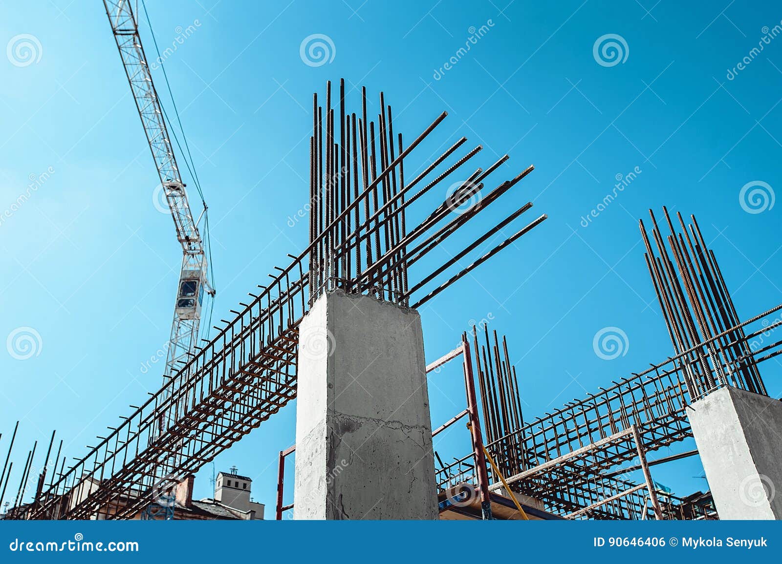 Steel Frames of a Building Under Construction, with Tower Crane on Top ...