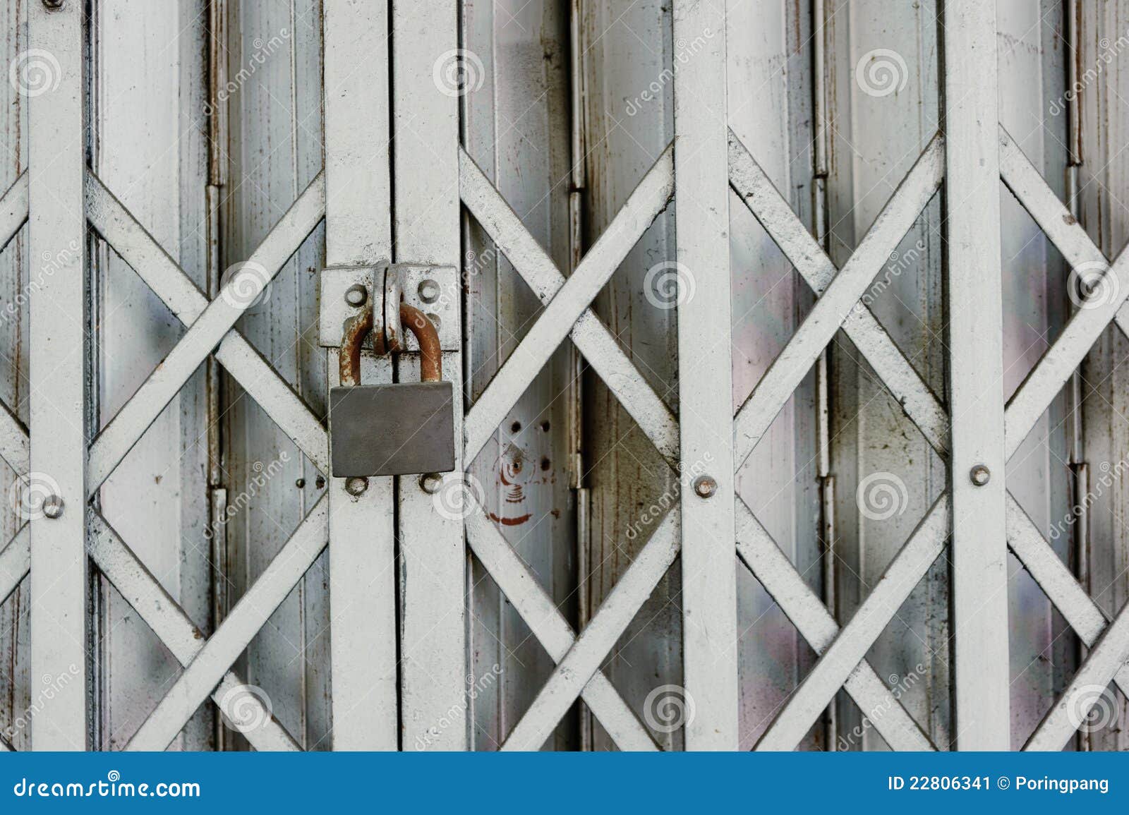 Steel gate with key lock stock image. Image of space - 22806341